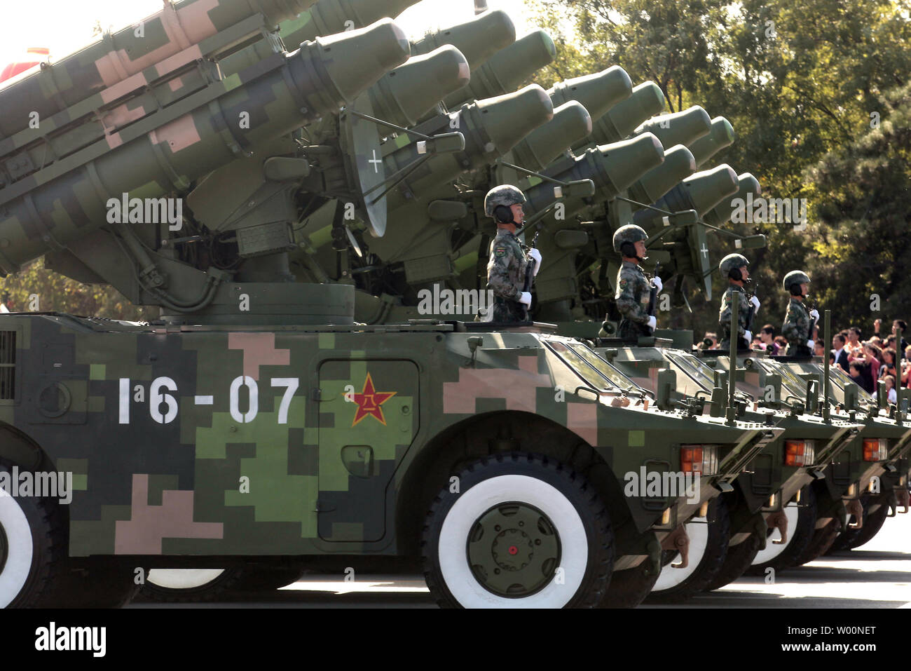Chinese soldiers participate in a massive military parade celebrating ...