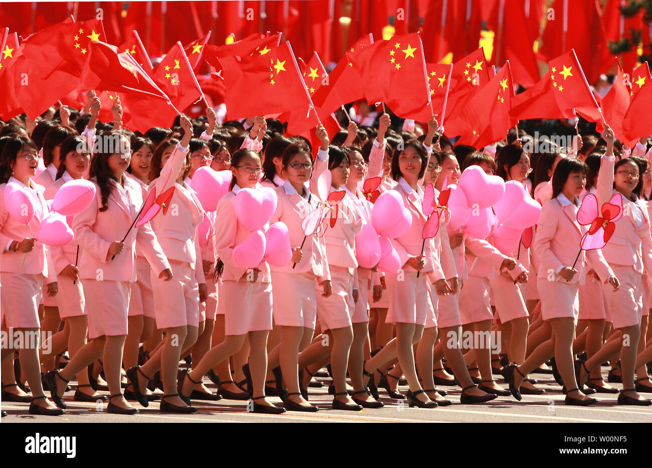 Chinese volunteers participate in a massive military parade celebrating ...