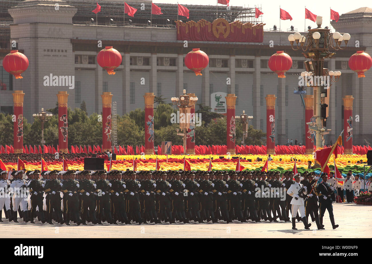 Chinese soldiers participate in a massive military parade celebrating ...