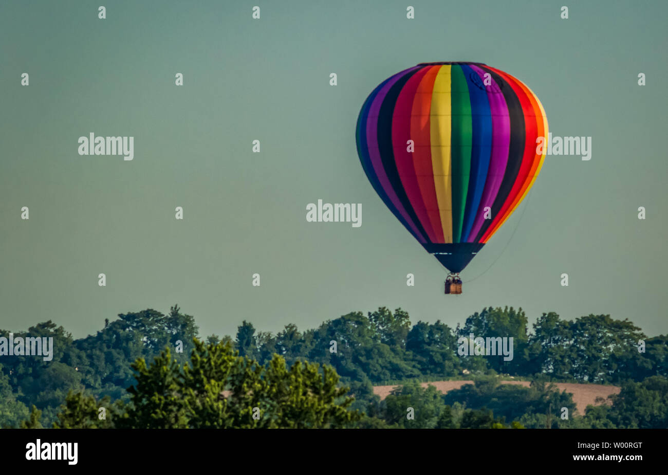 Rainbow colored hot air balloon hi-res stock photography and images - Alamy