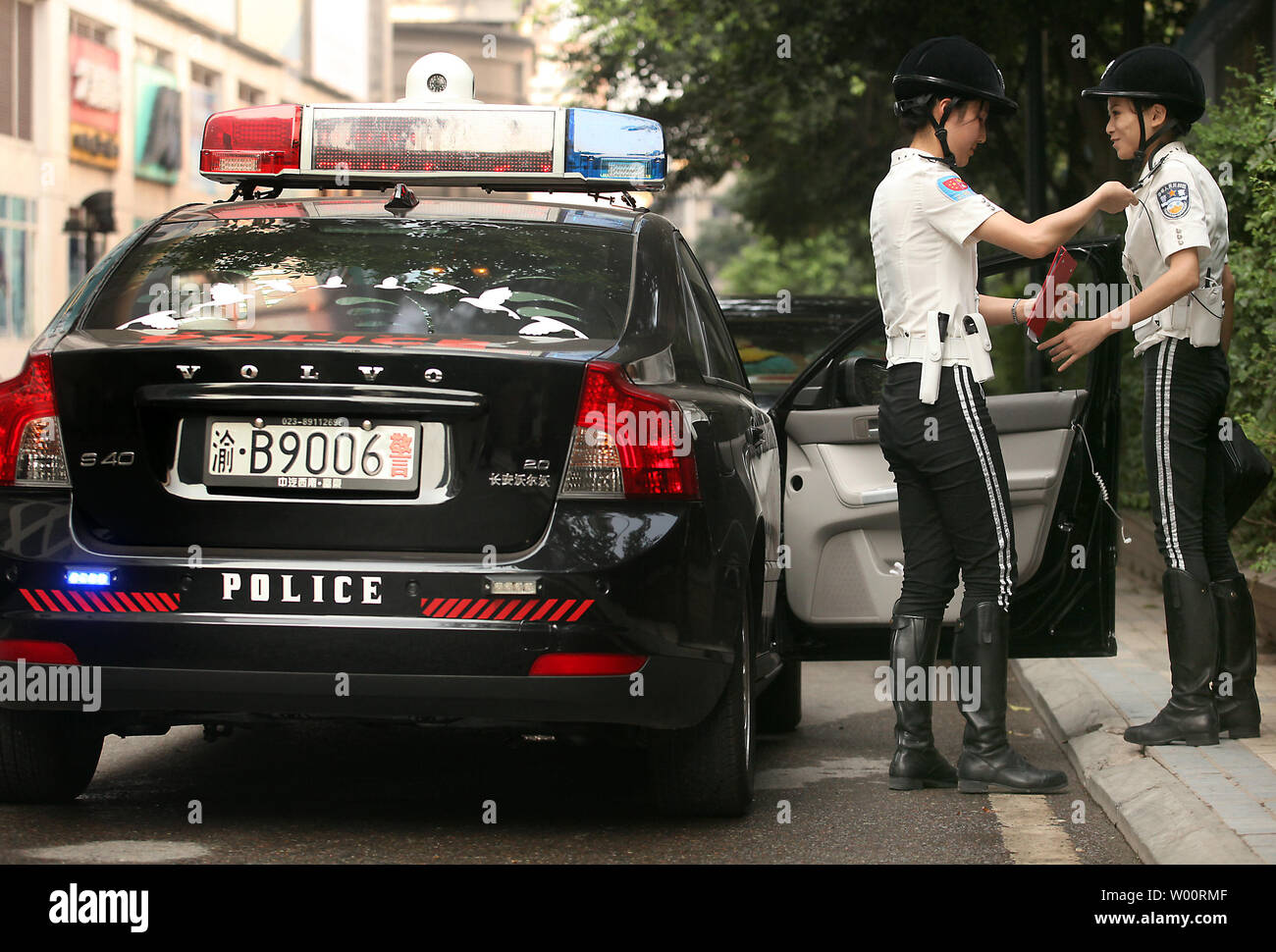 Women traffic police sport new uniforms along with a new Volvo police ...