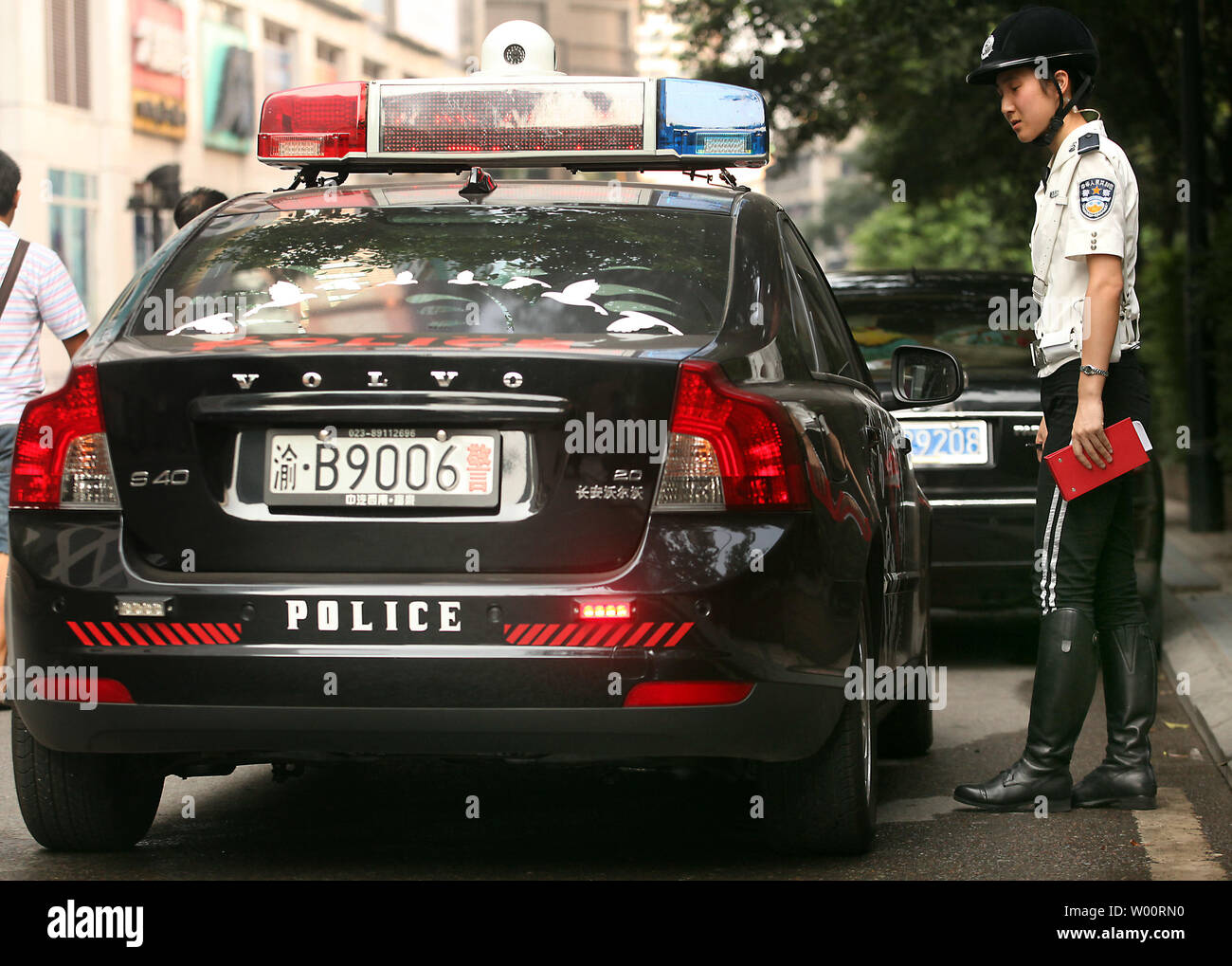 Women traffic police sport new uniforms along with a new Volvo police ...