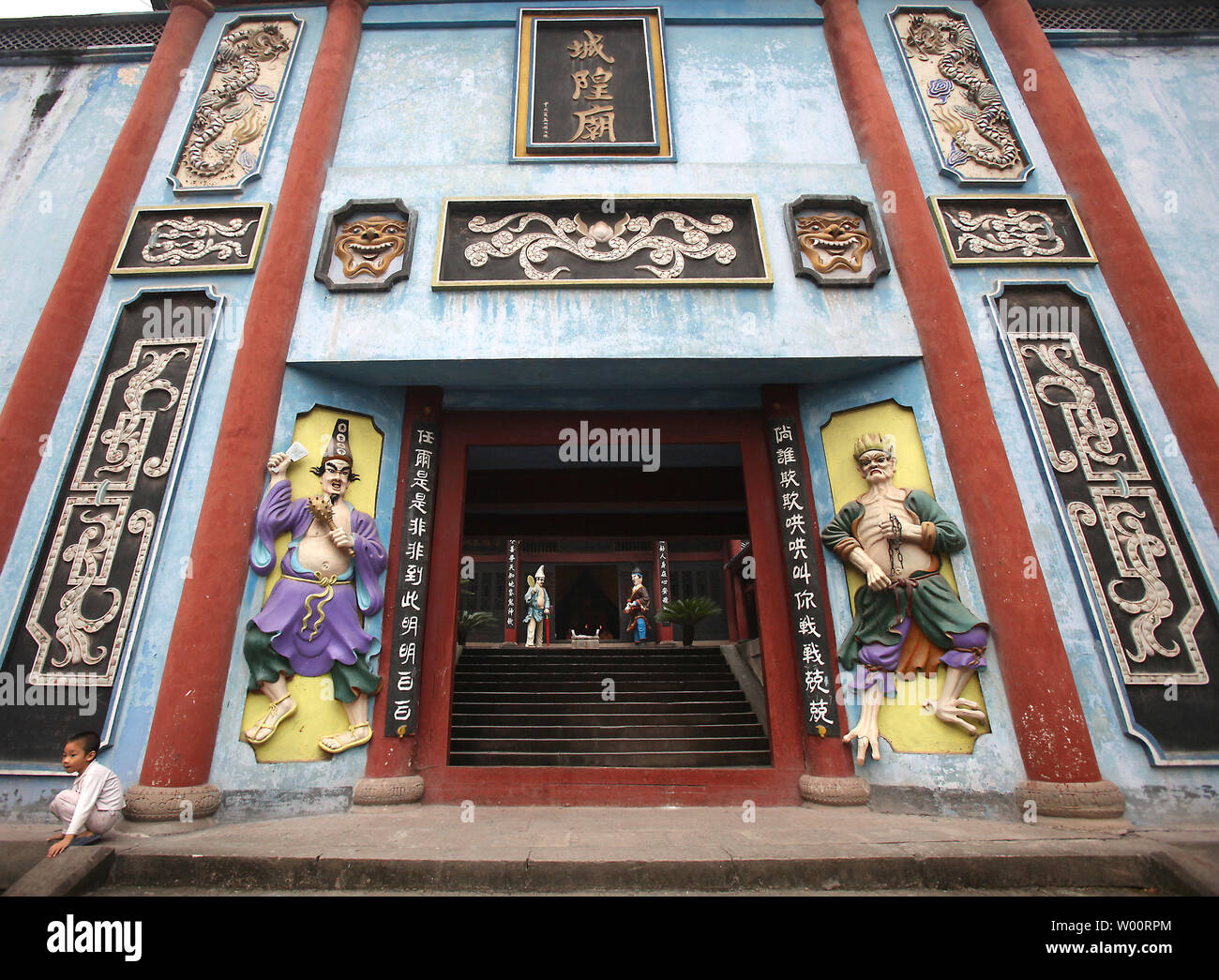 Guarded by demons, tourists visit the Ghost Temple in the city of ...