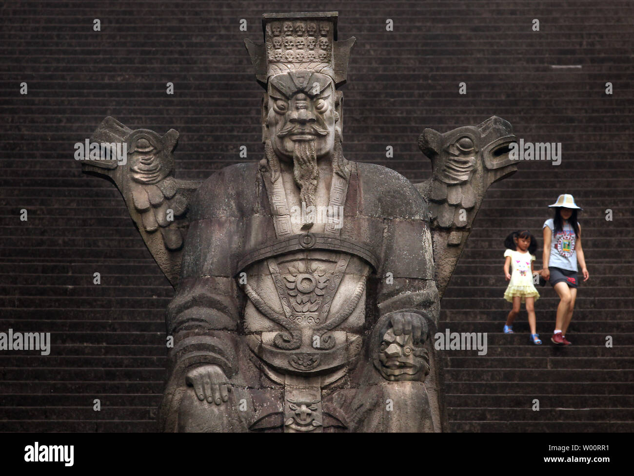Guarded by demons, tourists visit the Ghost Temple in the city of ...