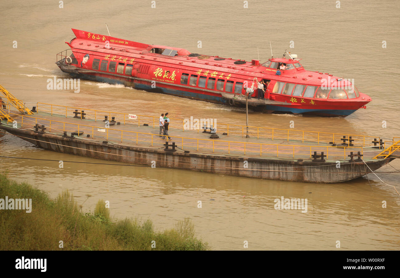 A Chinese hydrofoil ferries passengers to riverside towns on the banks ...