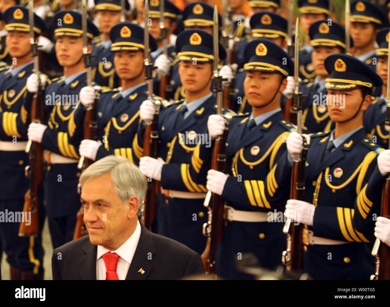 Chile's President Sebastian Pinera inspects a military honor guard ...