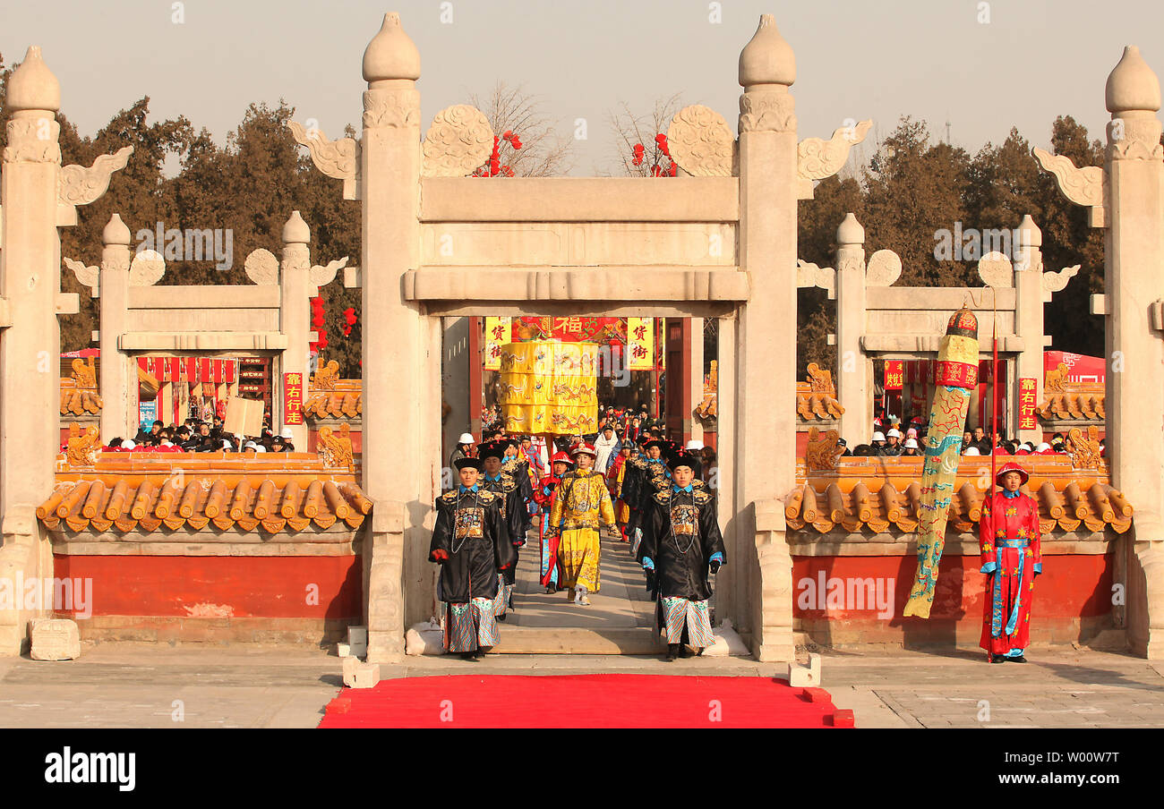 Chinese actors take part a performance adapted from an ancient ceremony ...
