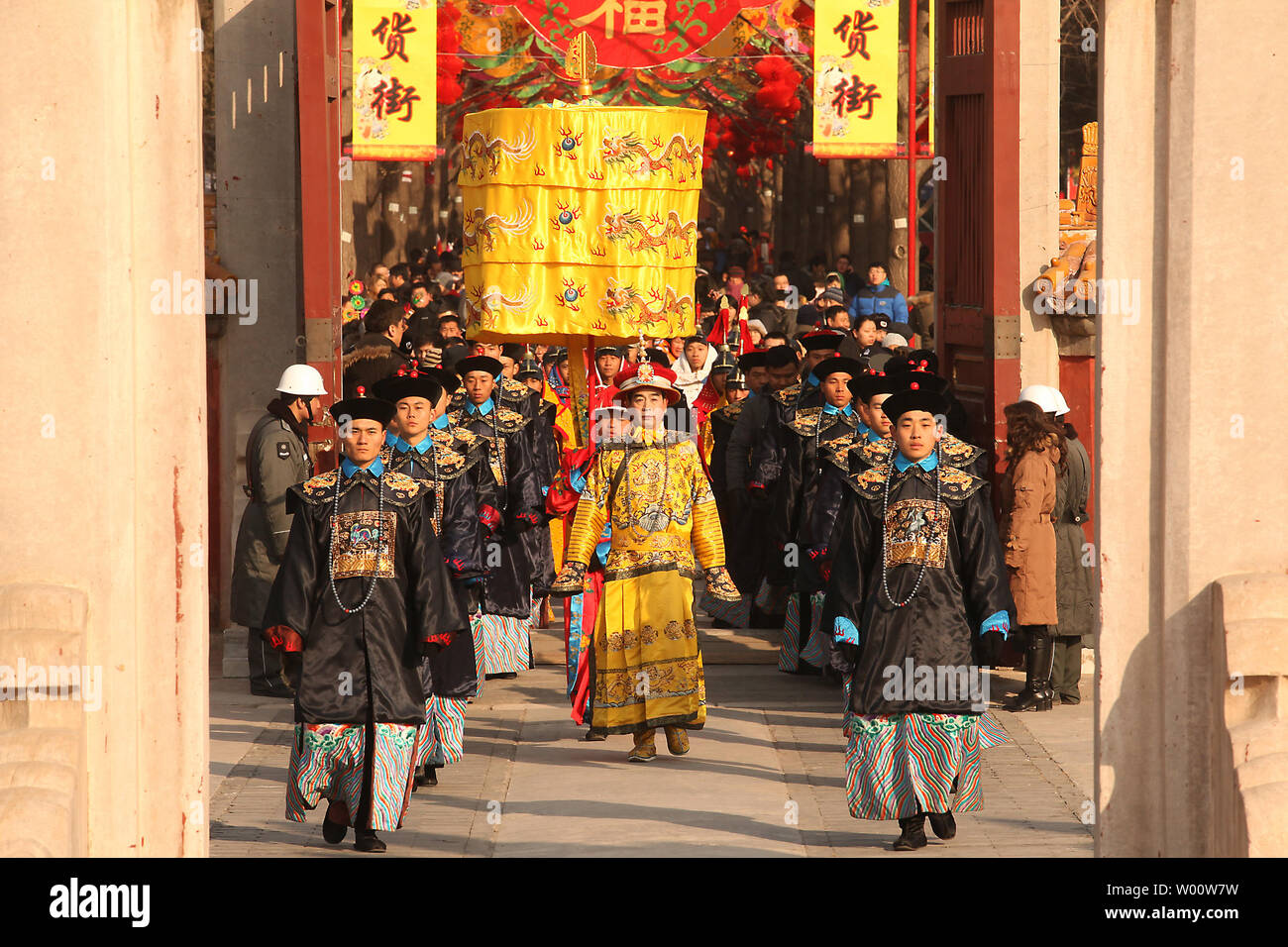 Chinese actors take part a performance adapted from an ancient ceremony ...