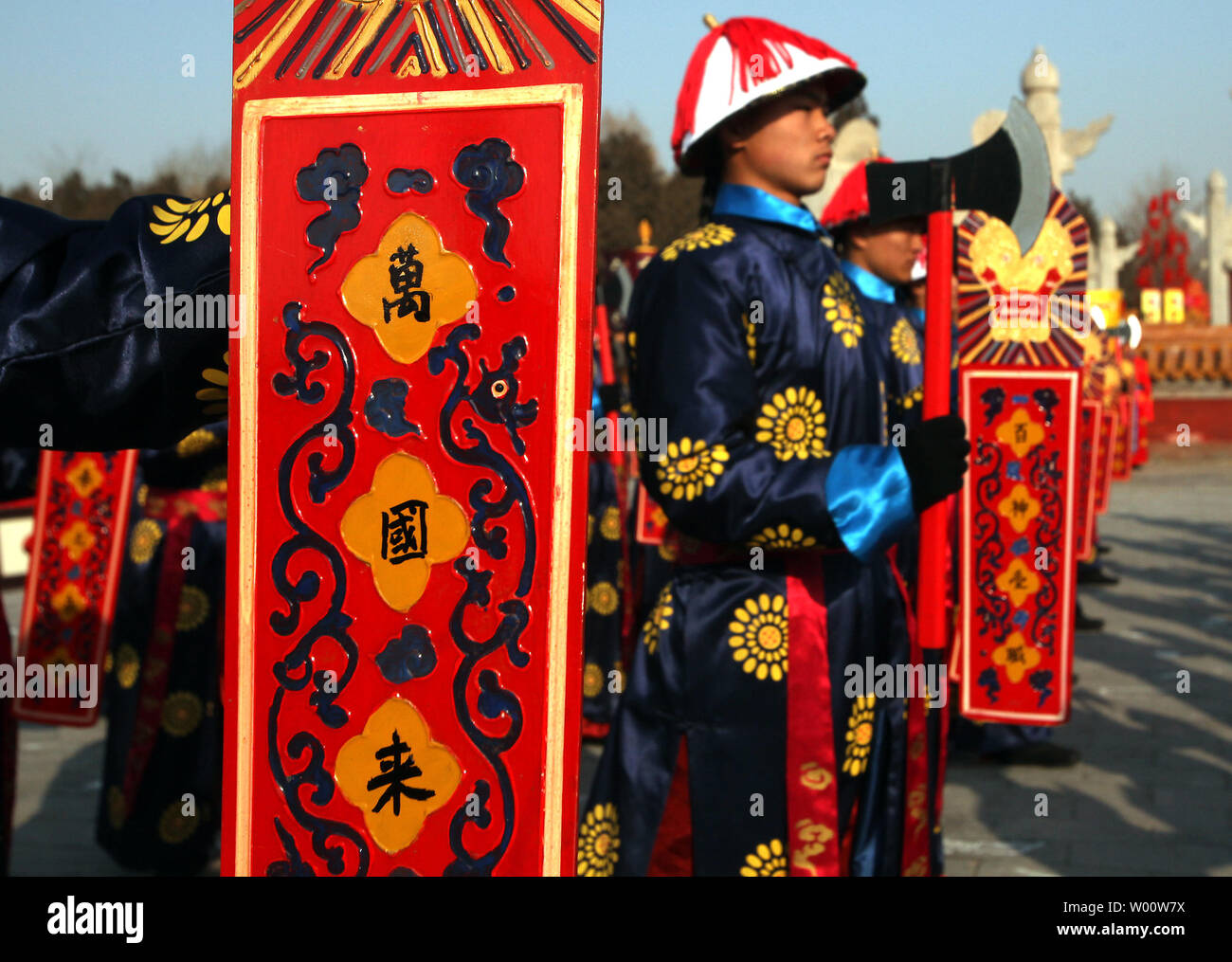 Chinese actors take part a performance adapted from an ancient ceremony ...
