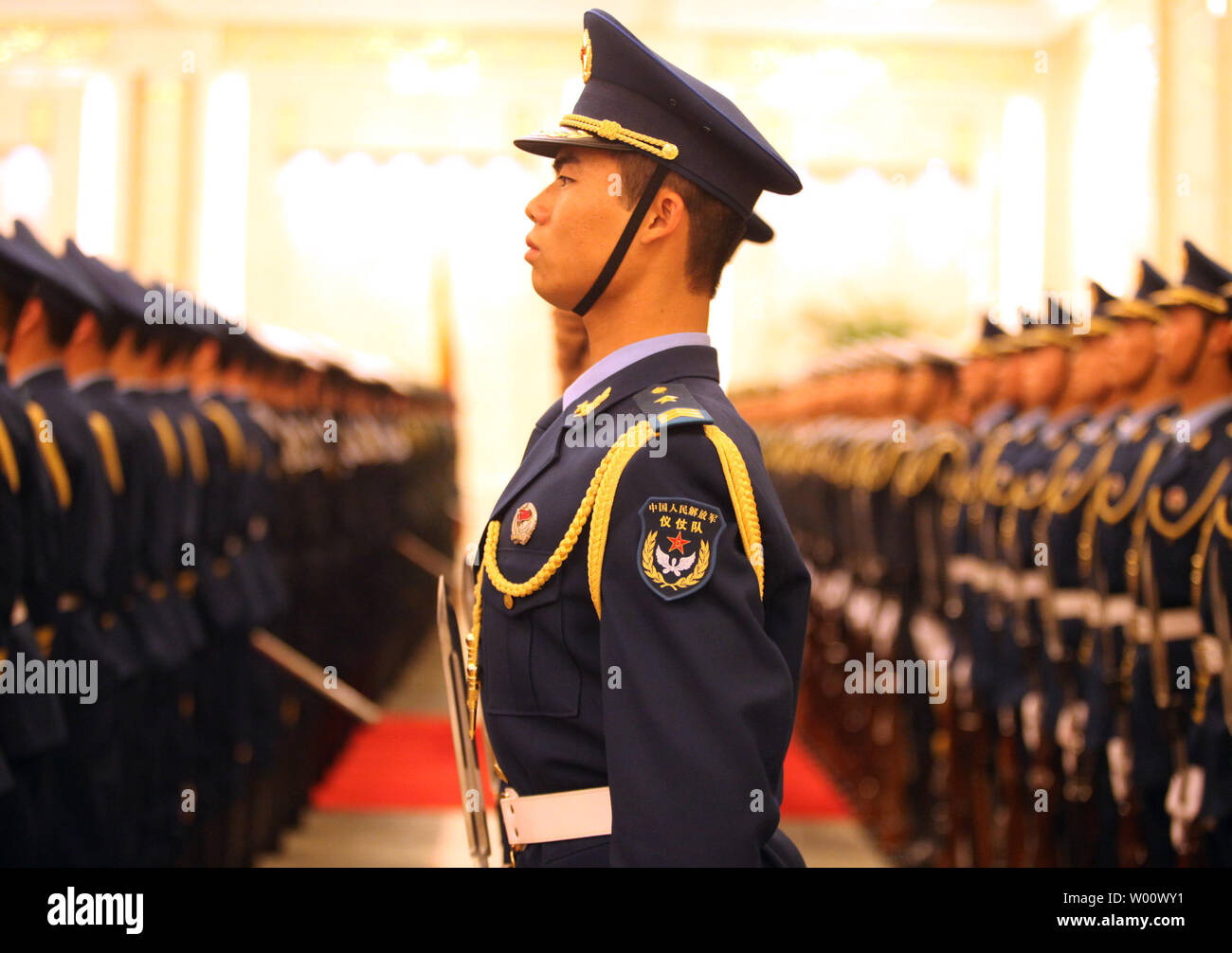 Chinese soldiers perform honor guard duties during a welcoming ceremony ...