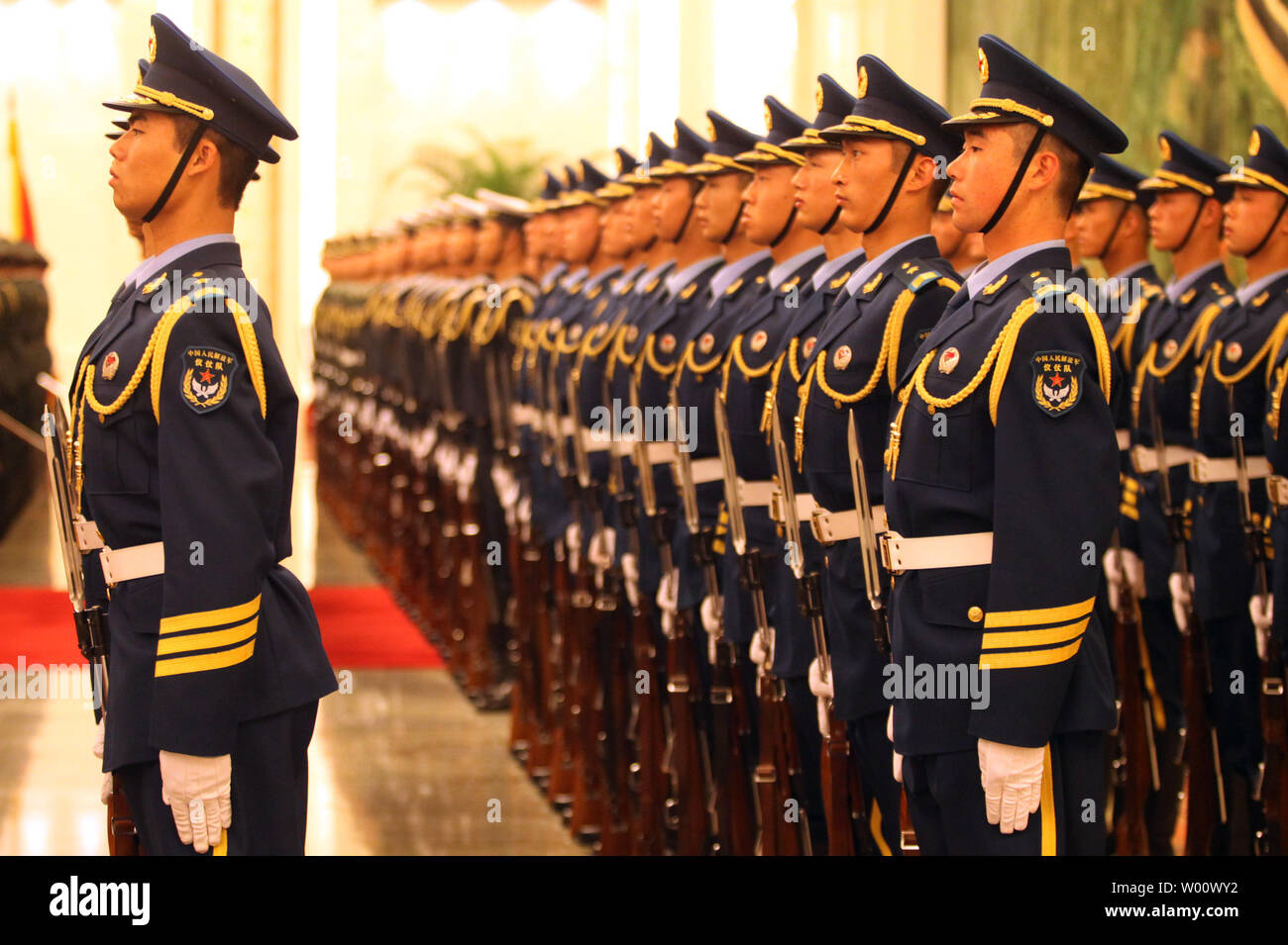 Chinese soldiers perform honor guard duties during a welcoming ceremony ...