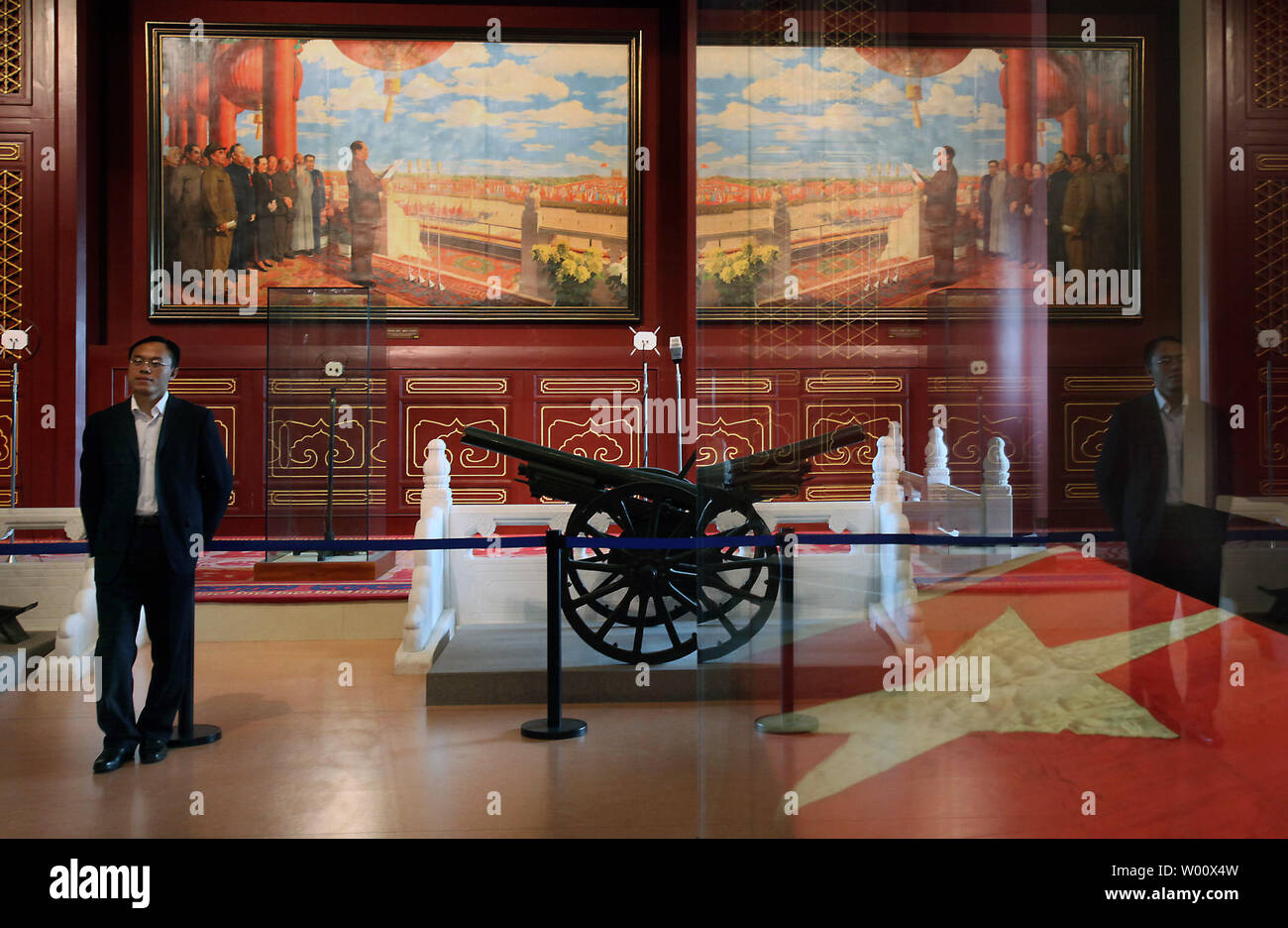 Chinese tourists look at relics from when former Chairman Mao Zedong ...