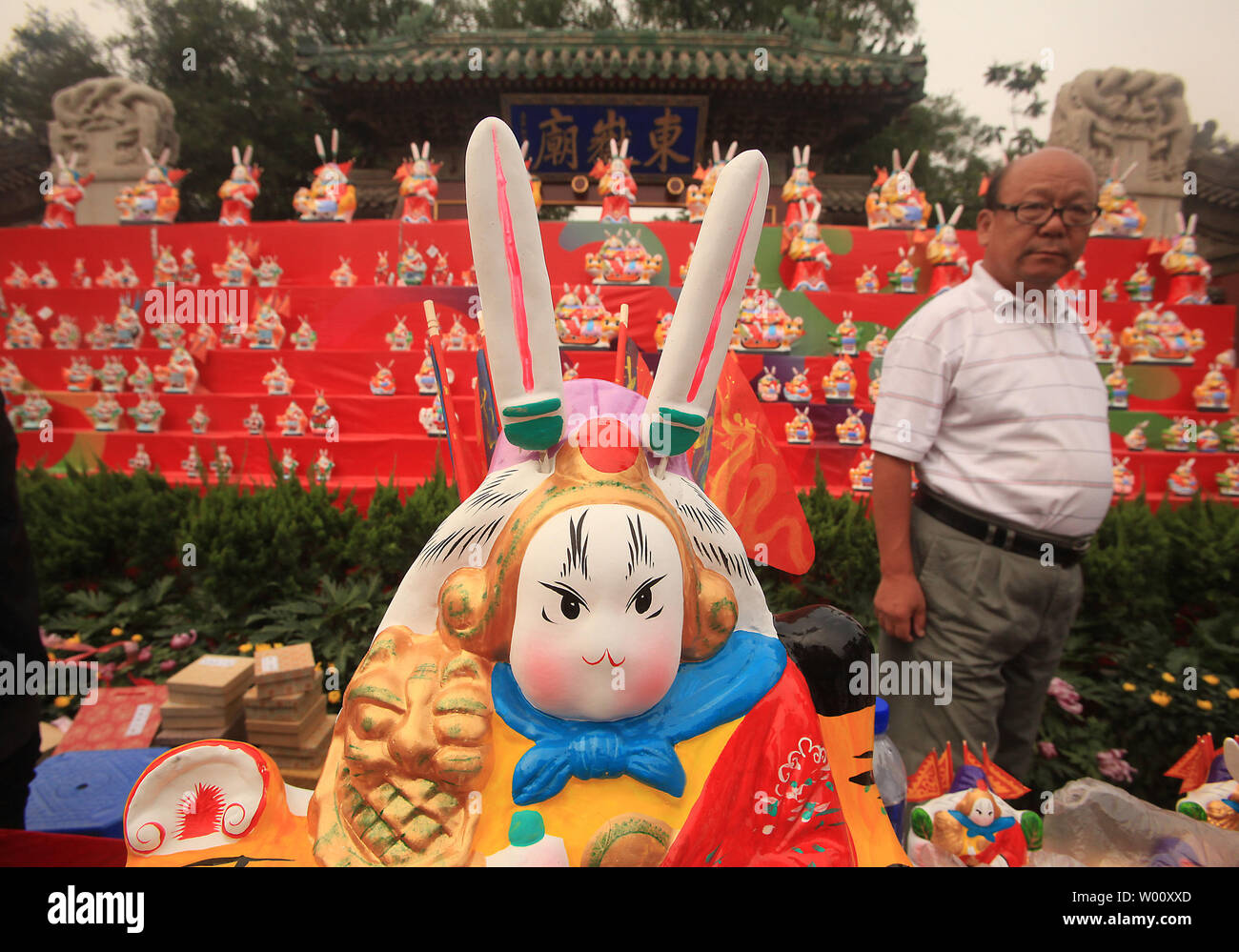 Rabbit God statues, which represent longevity, are sold outside a ...