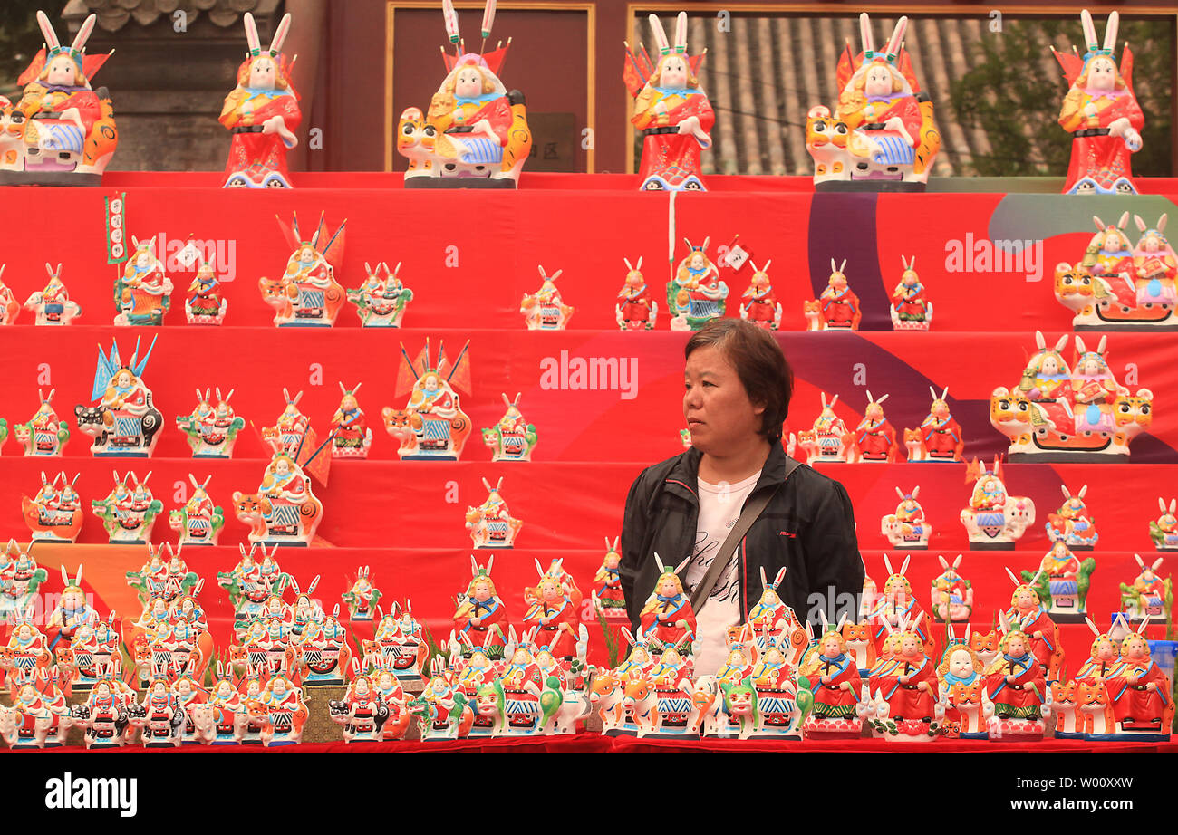 Rabbit God statues, which represent longevity, are sold outside a ...