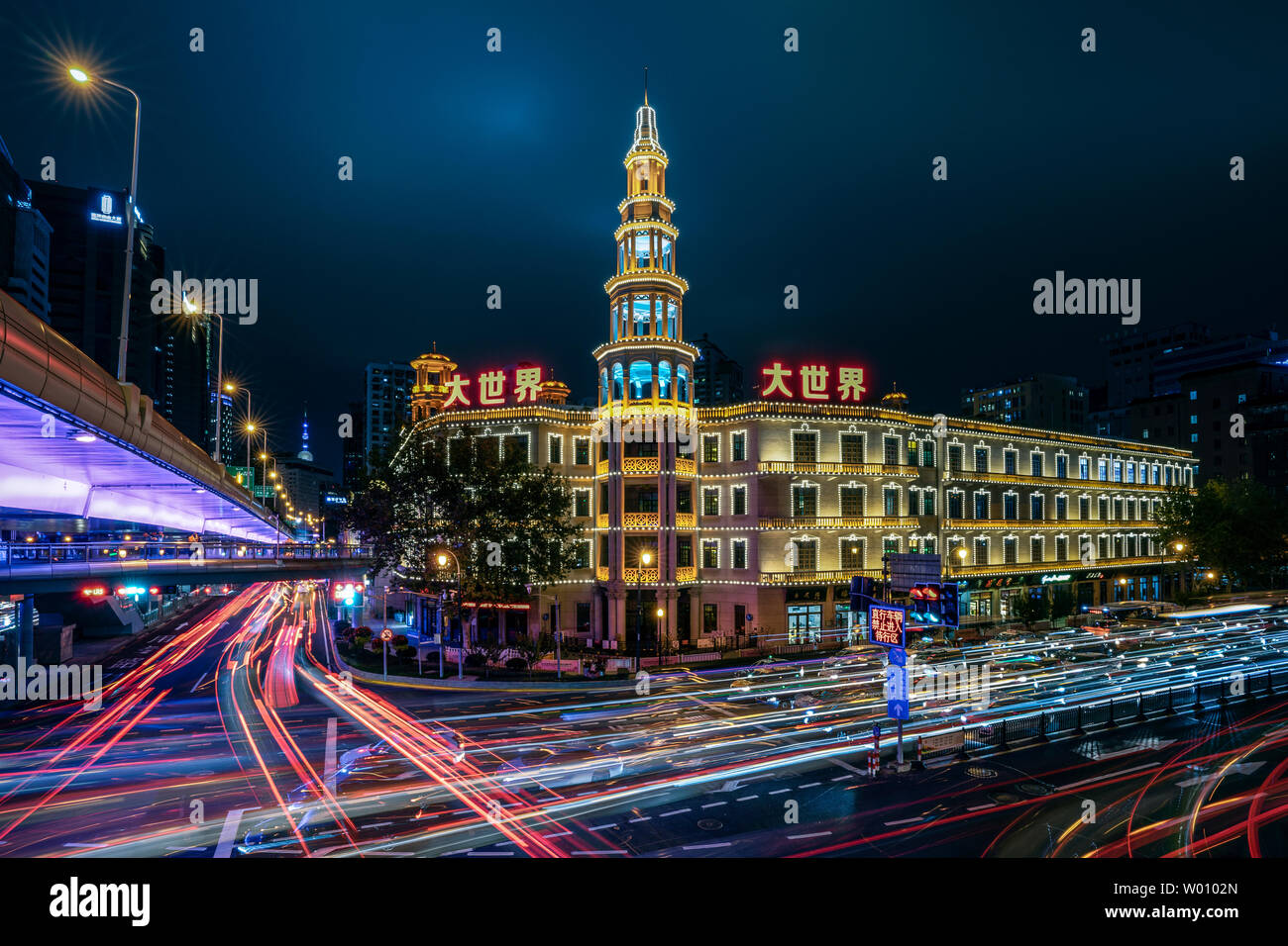 Shanghai big world, gold buildings and tracks Stock Photo - Alamy