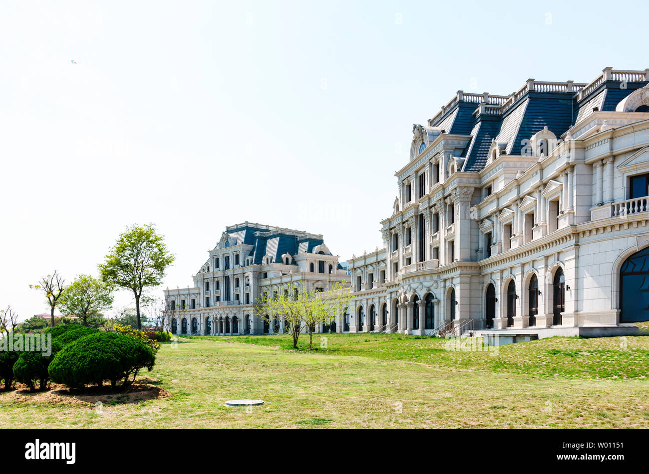 Antique buildings by the park Stock Photo - Alamy