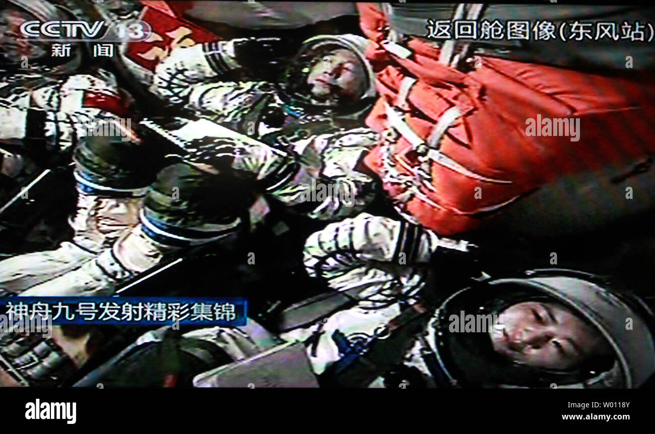 China's first female astronaut Liu Yang ( R ), along with astronauts ...