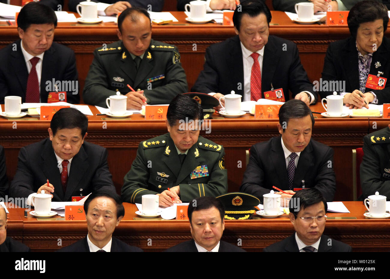 Chinese delegates of China's Communist Party attend the opening ...