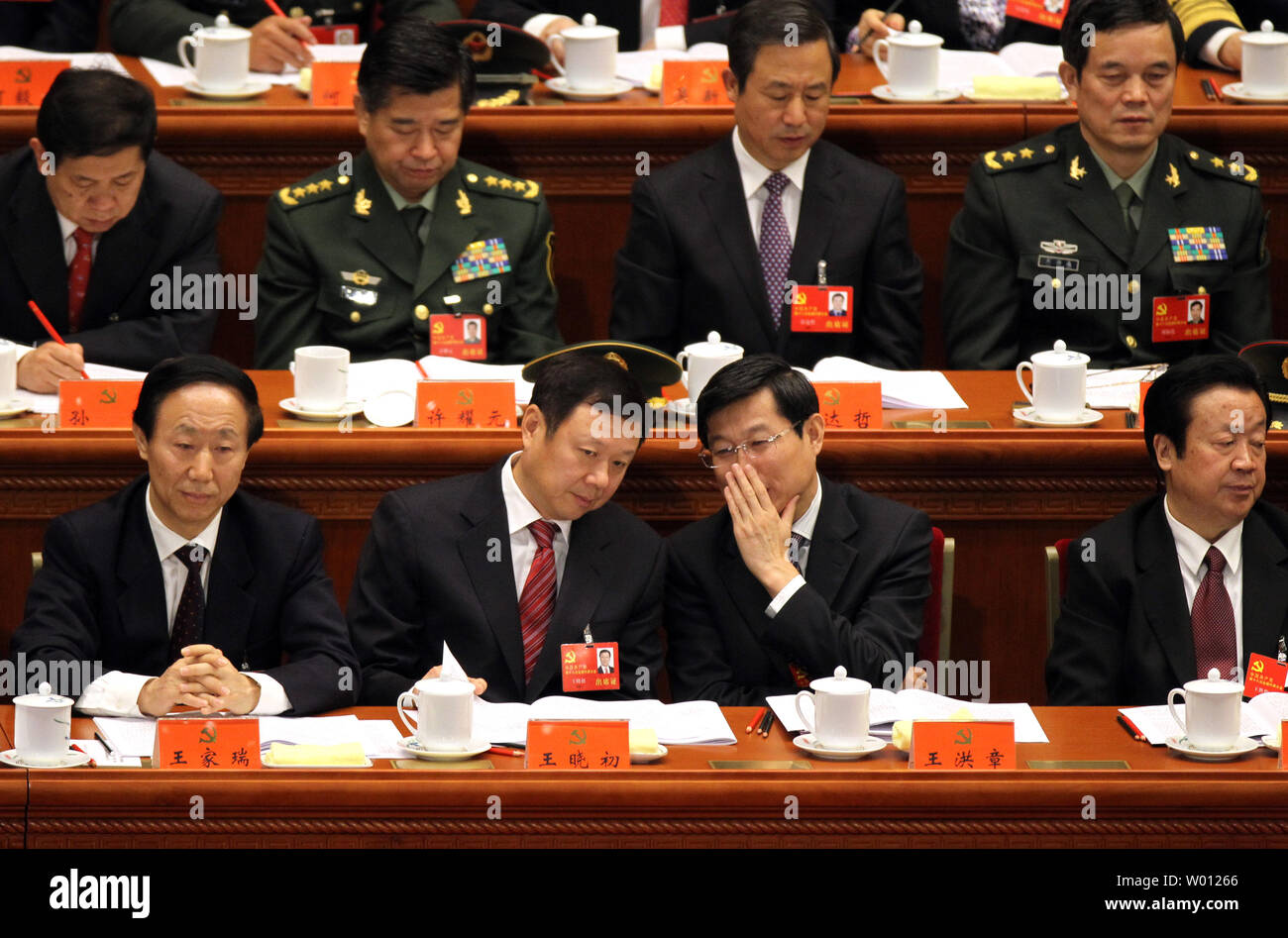 Chinese delegates of China's Communist Party attend the opening ...
