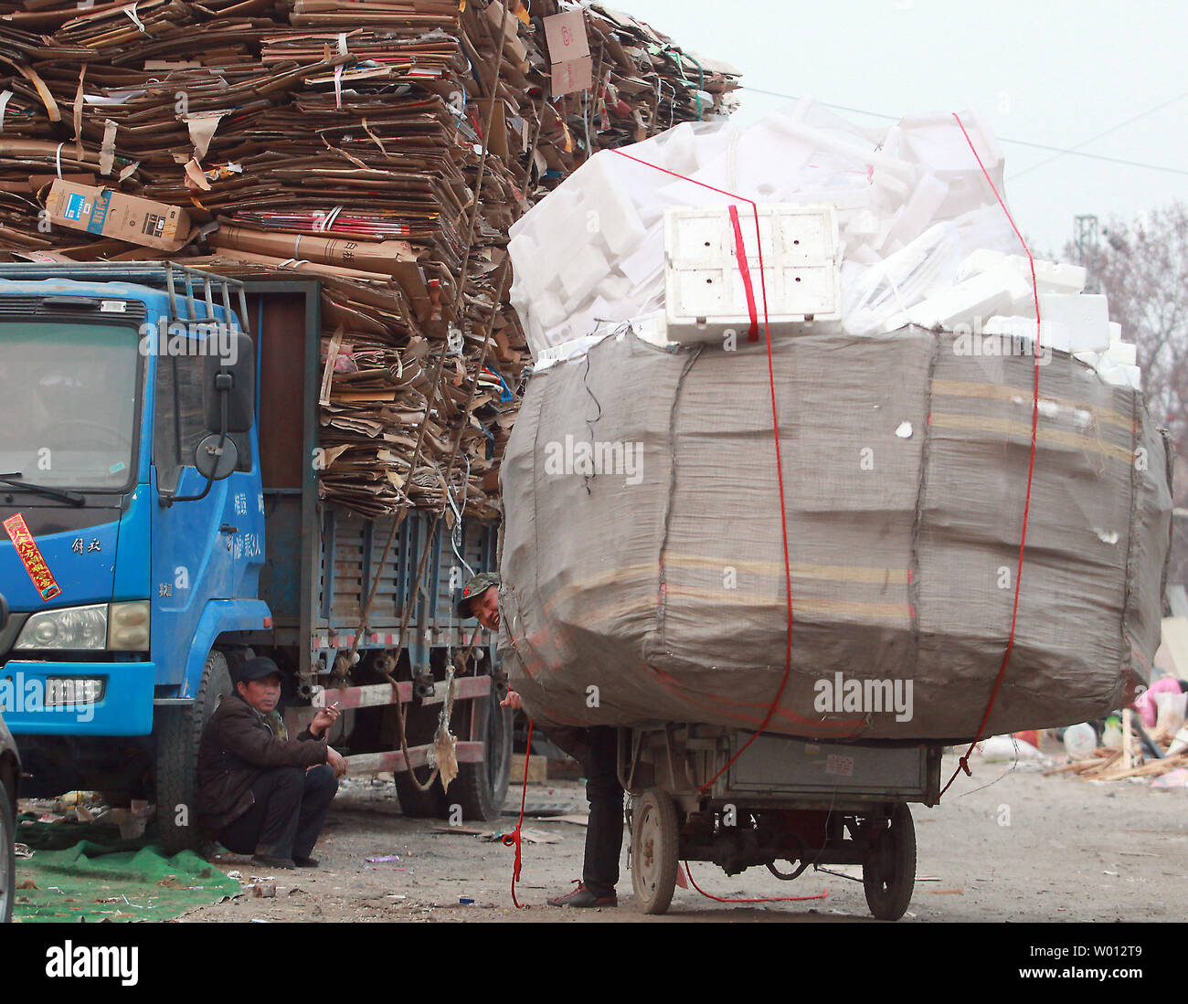 Chinese trash collectors deliver all that can be recycled at a trash ...