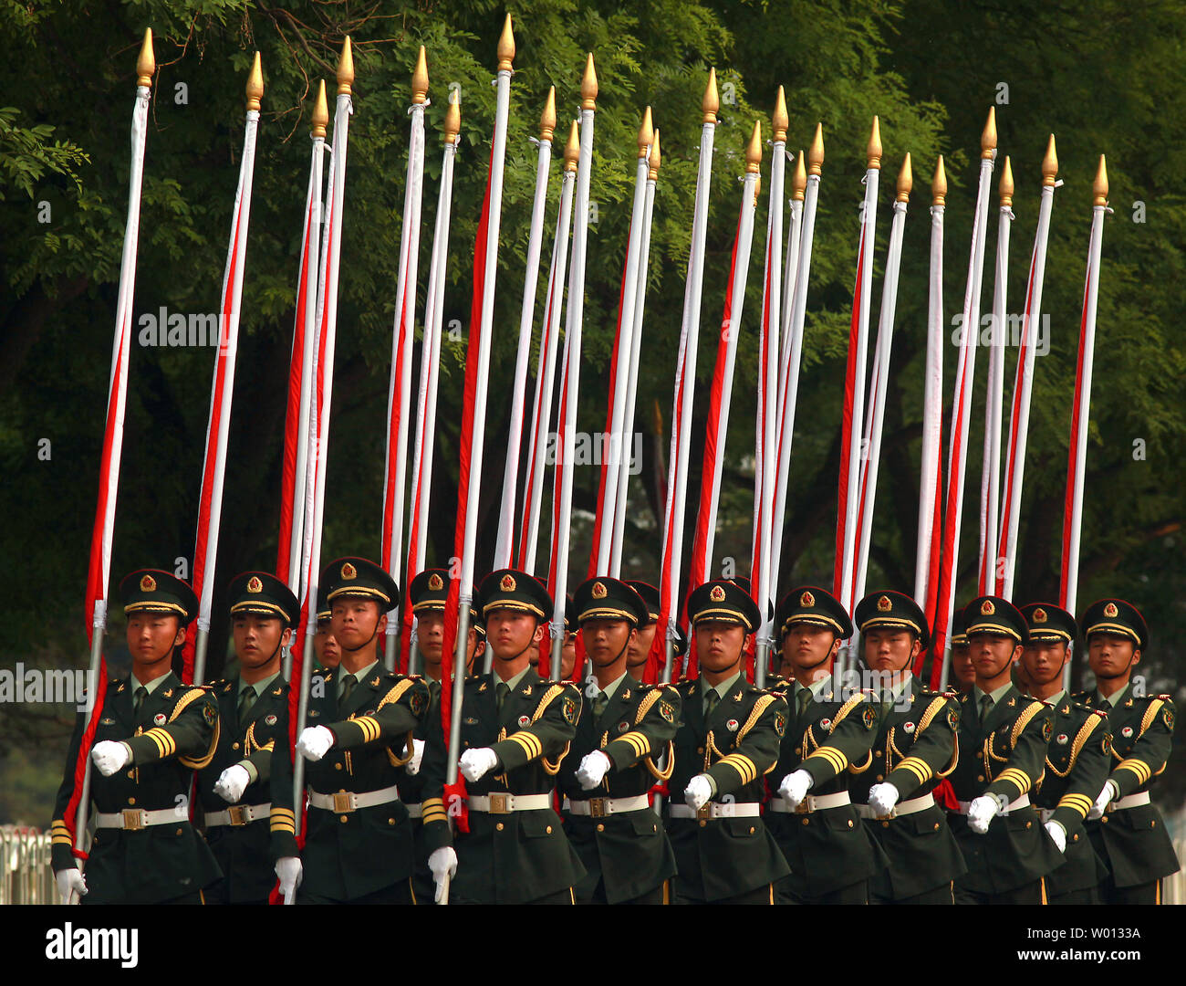 Chinese soldiers perform honor guard duties during a welcoming ceremony ...
