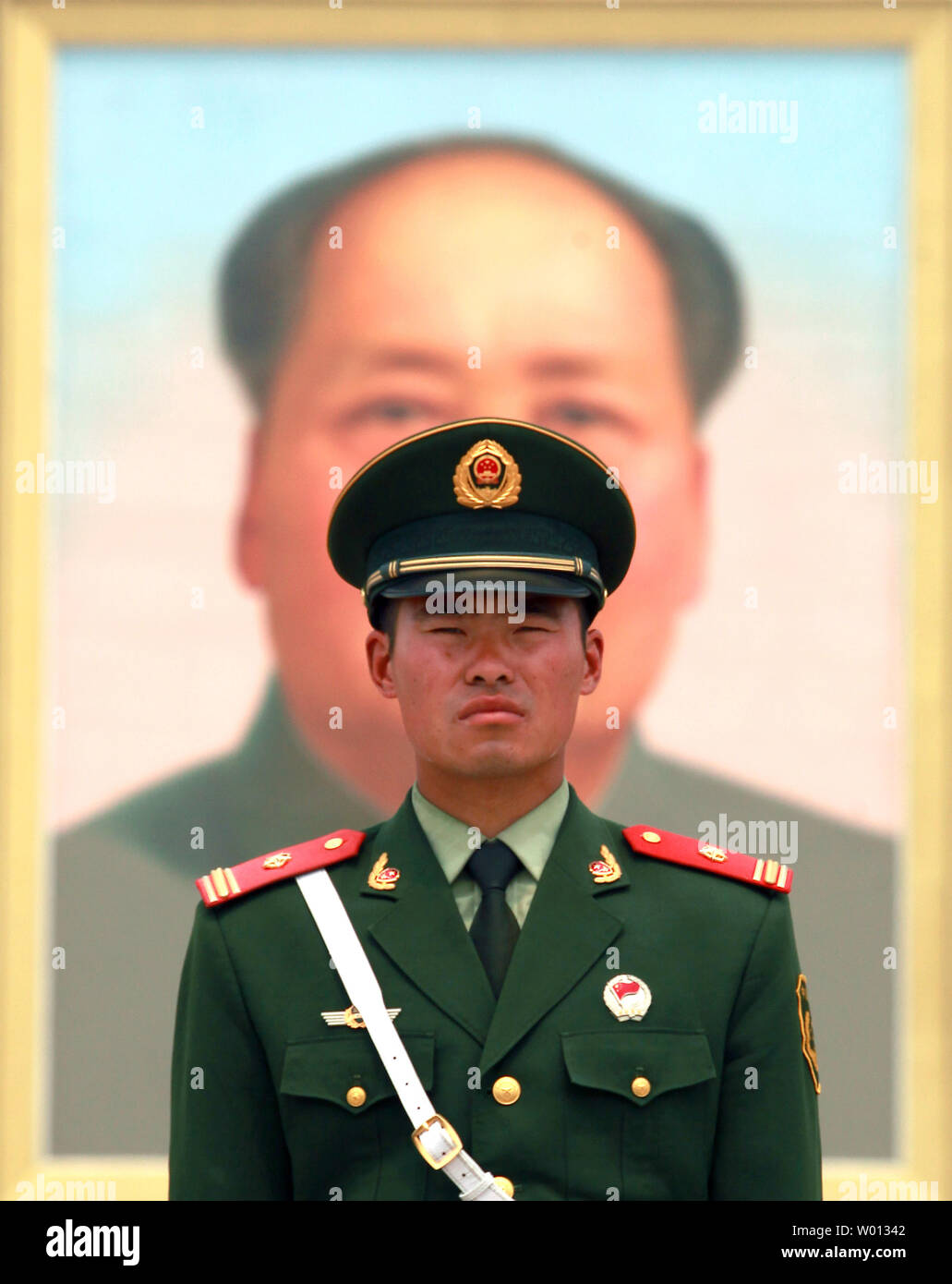 A Chinese soldier stands watch in front of Tiananmen Square's North ...