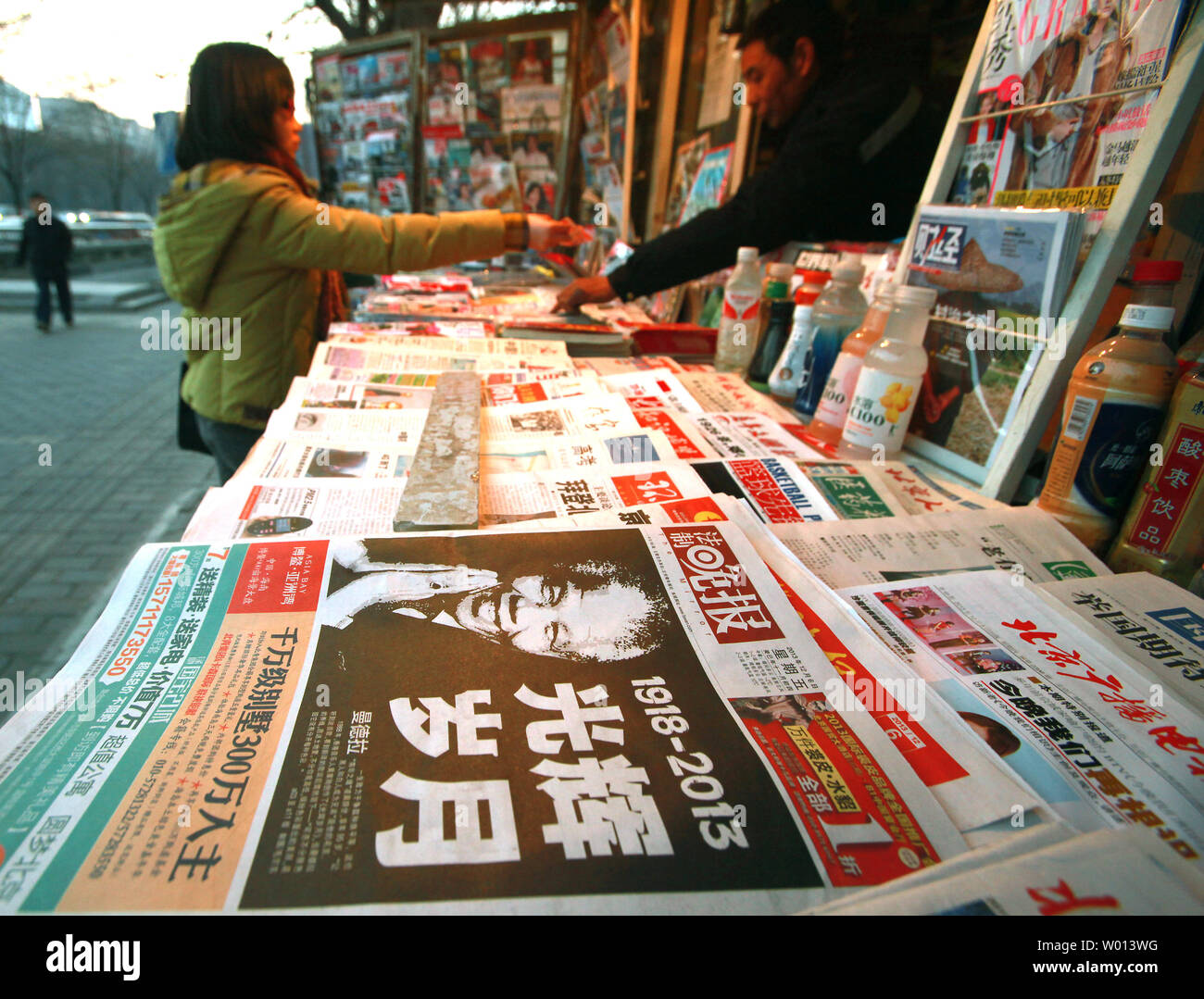 Chinese newspapers feature front page coverage of the passing of Nelson ...