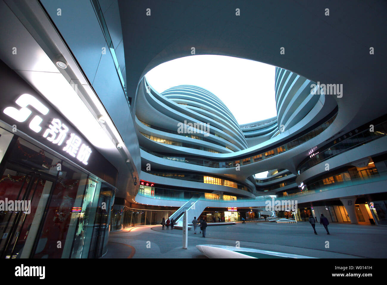 Zaha hadid architects galaxy soho beijing china hi-res stock ...