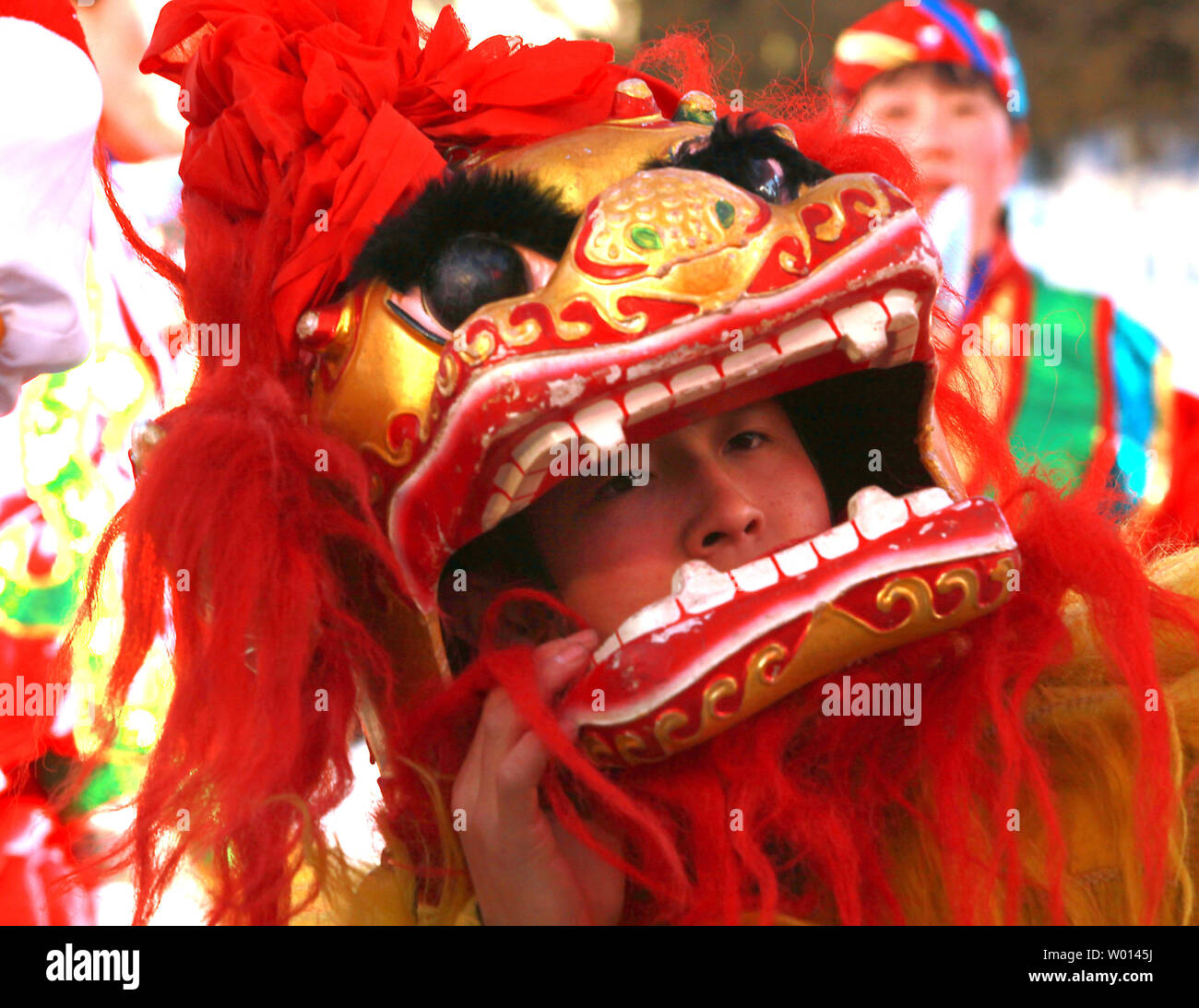 Chinese dancers perform a traditional Spring Festival ceremony to ...
