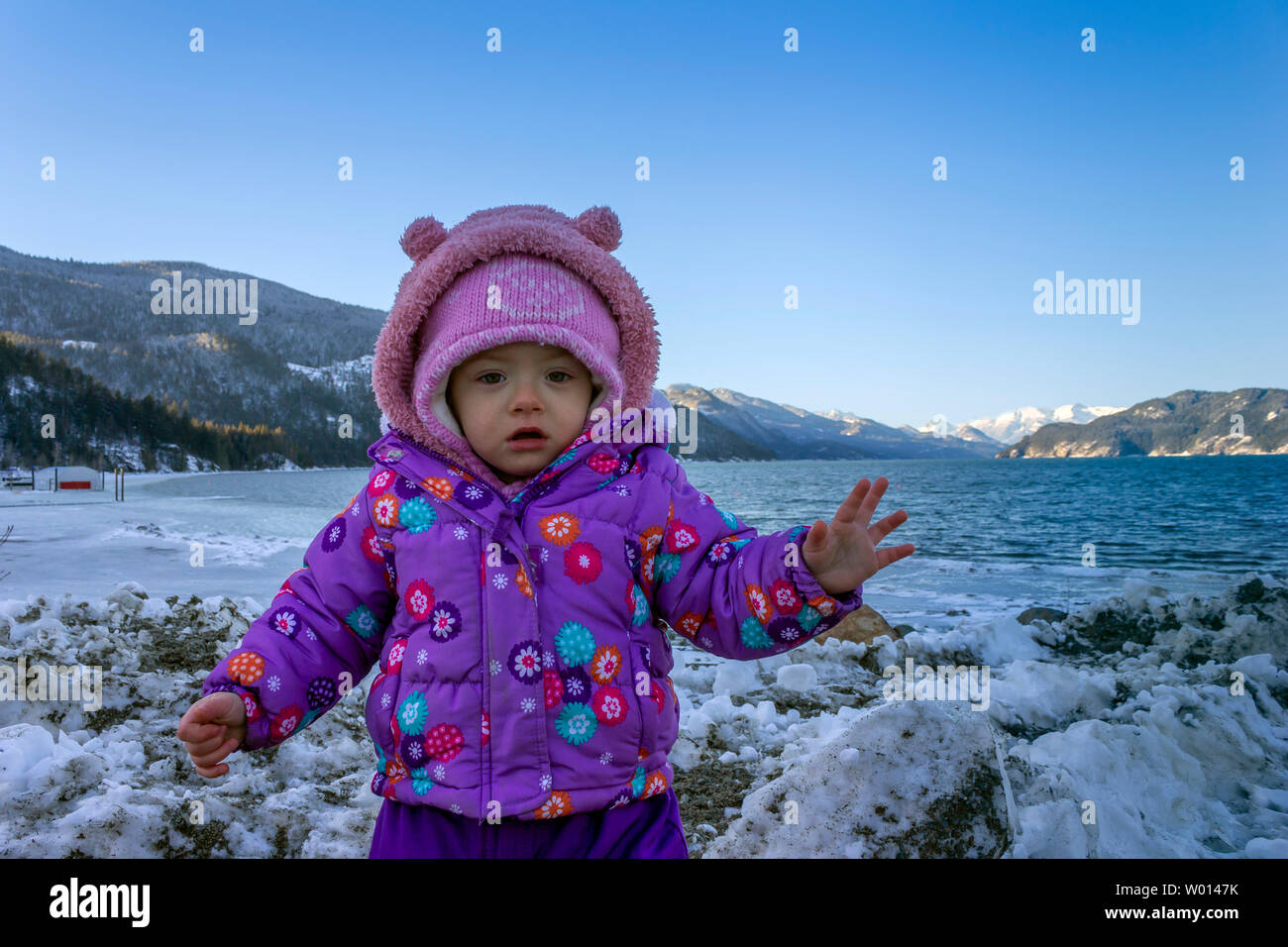 20 months old baby enjoying the nice weather outside. Toddler girl ...
