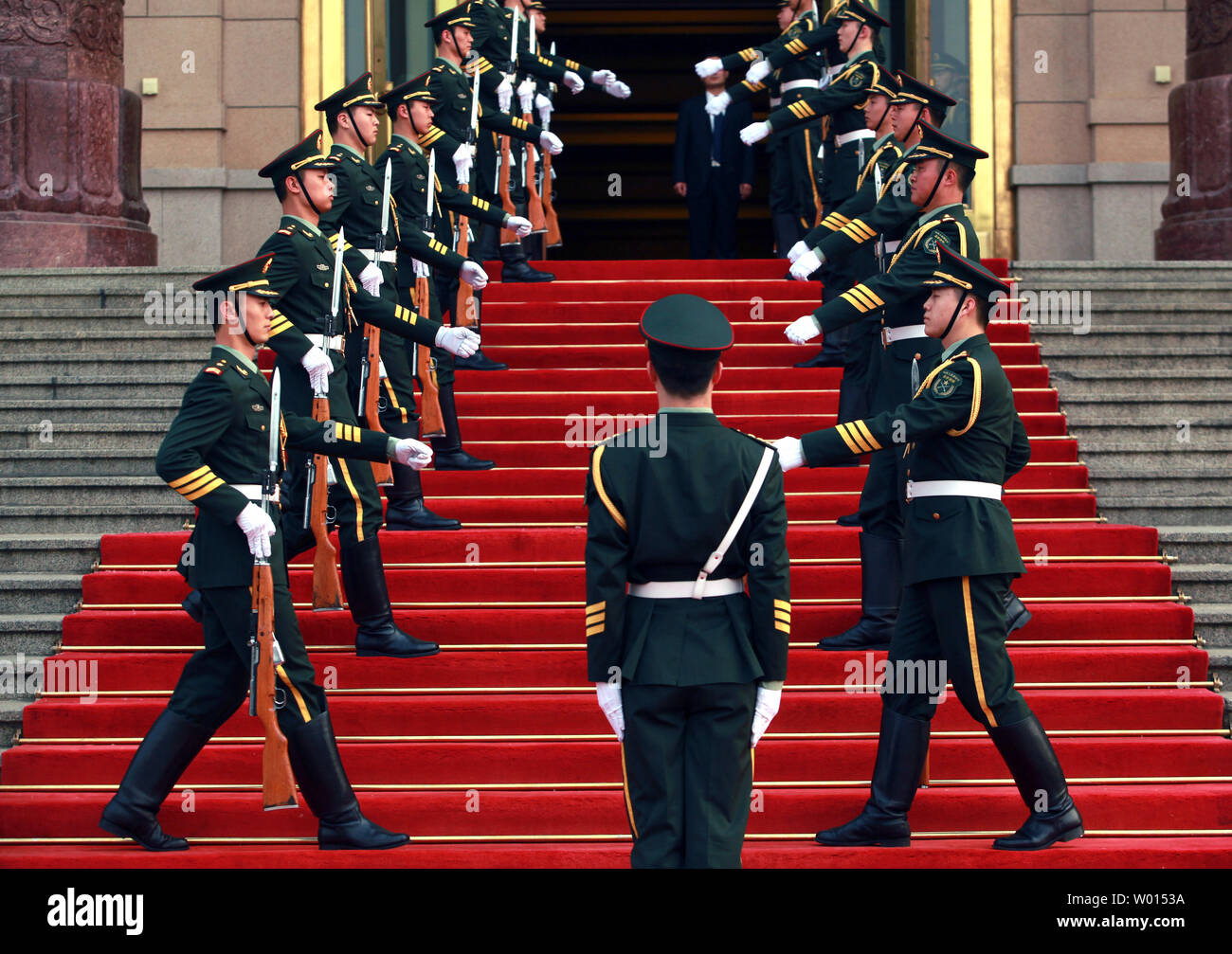 Chinese soldiers prepare for honor guard duties as Israeli President ...