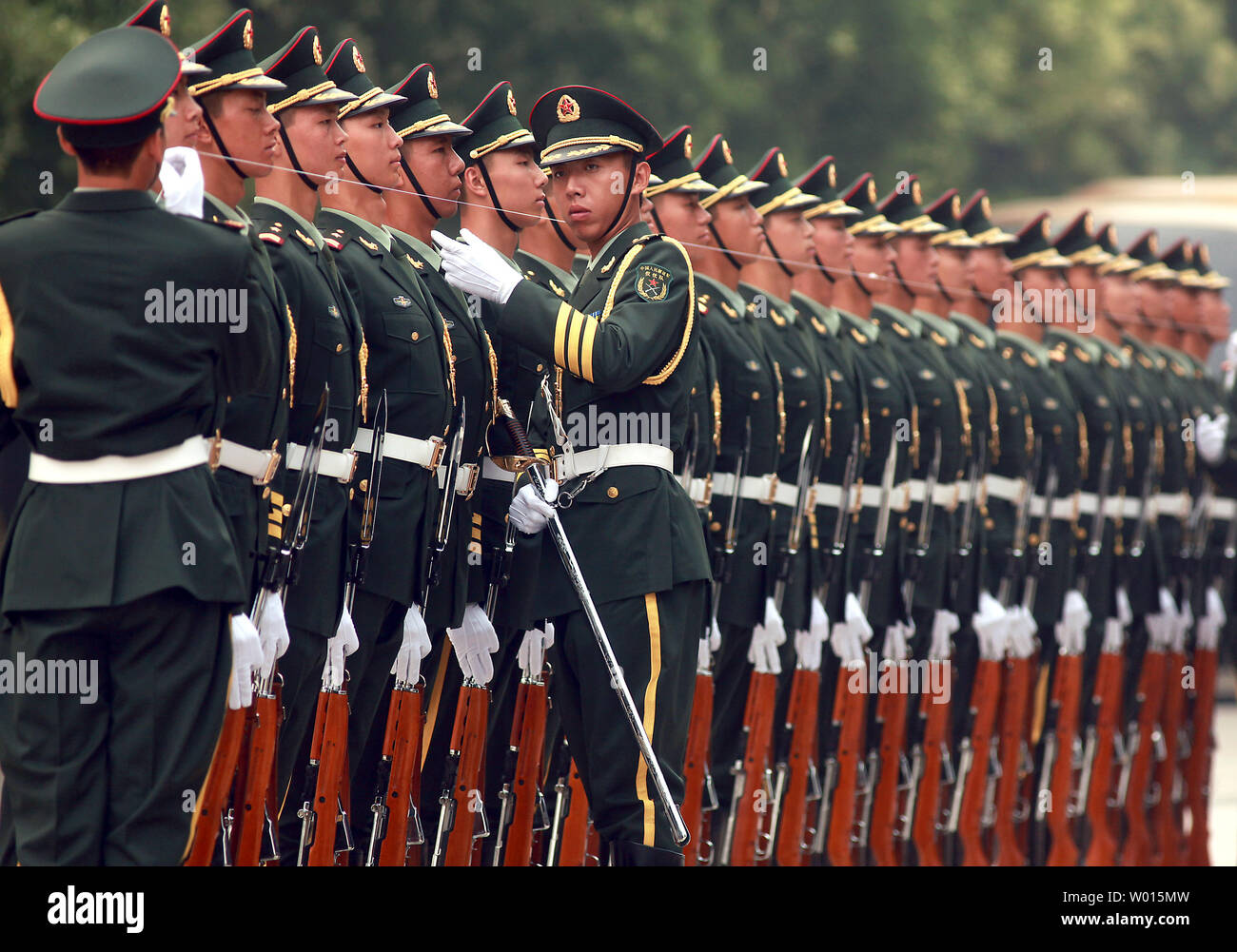 Chinese soldiers prepare to perform honor guard duties for German ...