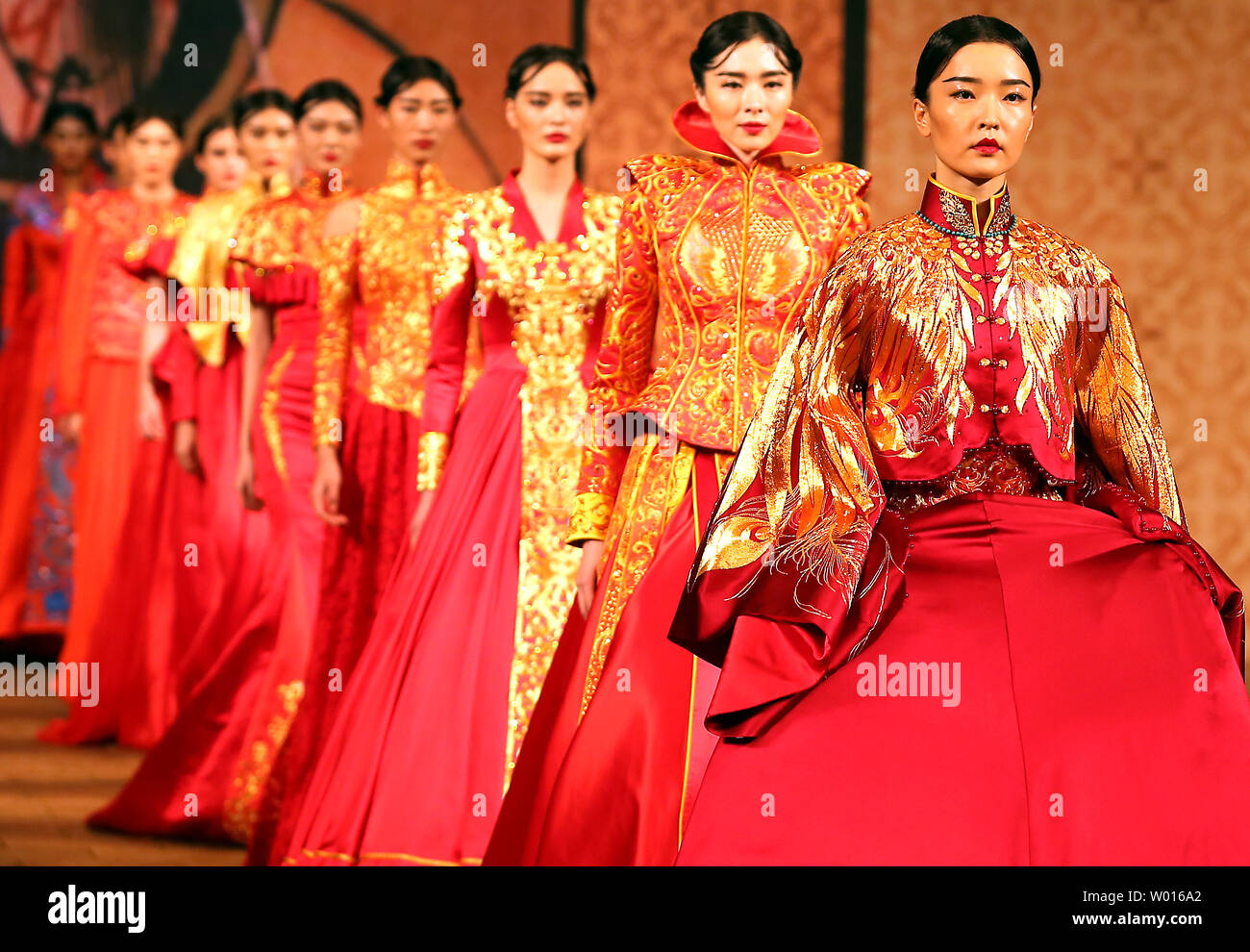 Chinese models wear clothing from the 2015 NE-Tiger Haute Couture ...