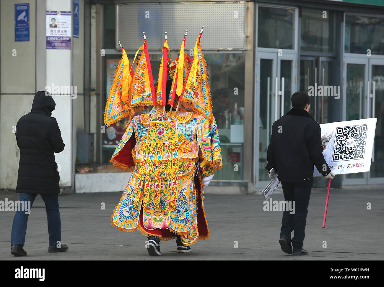 Chinese plain clothes police detain a man trying to make money as a ...