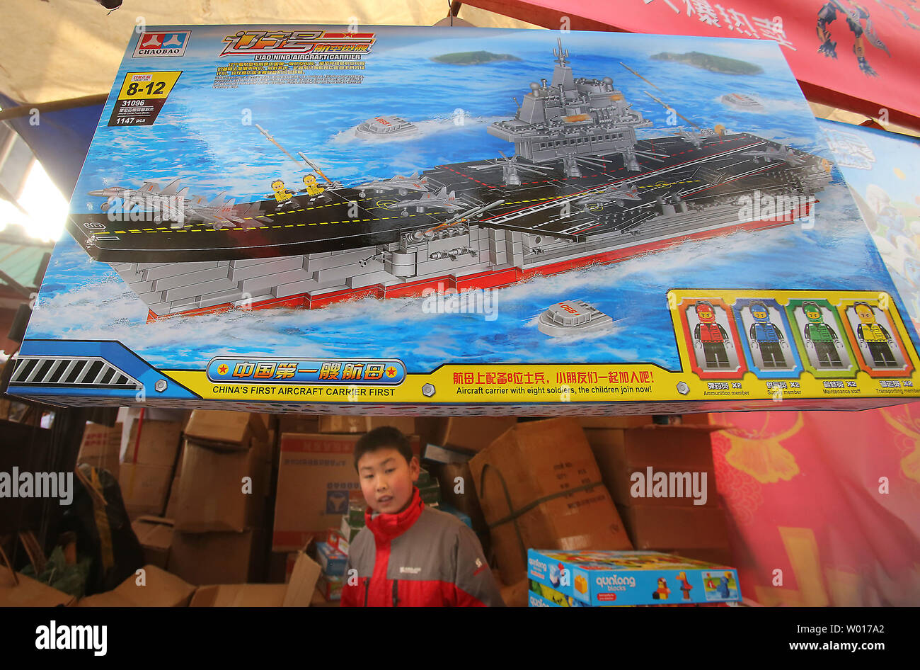 A Chinese vendor sells a 'lego' model of China's first aircraft carrier ...