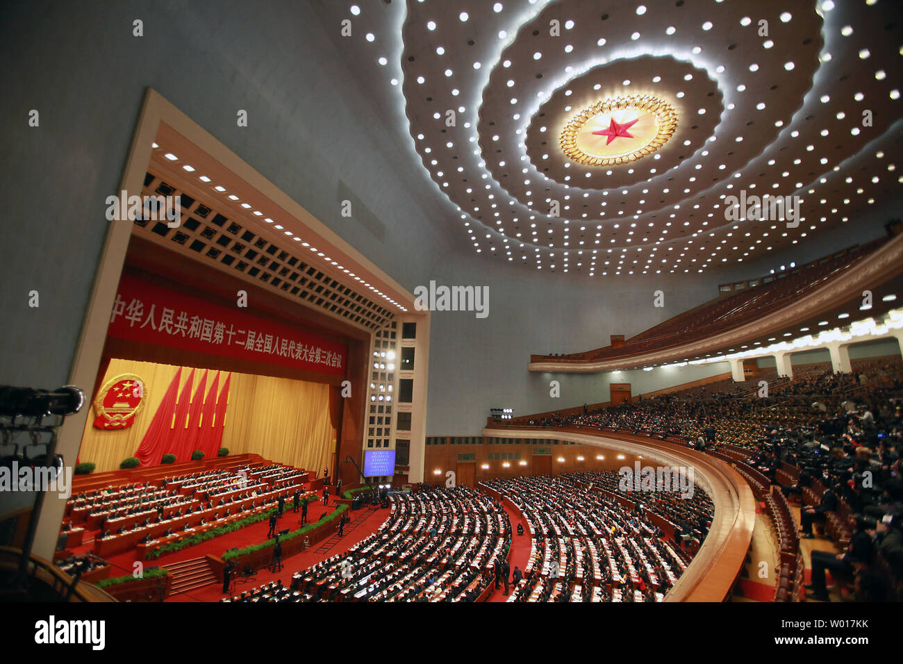 China's top leaders and delegates attend the closing session of the ...