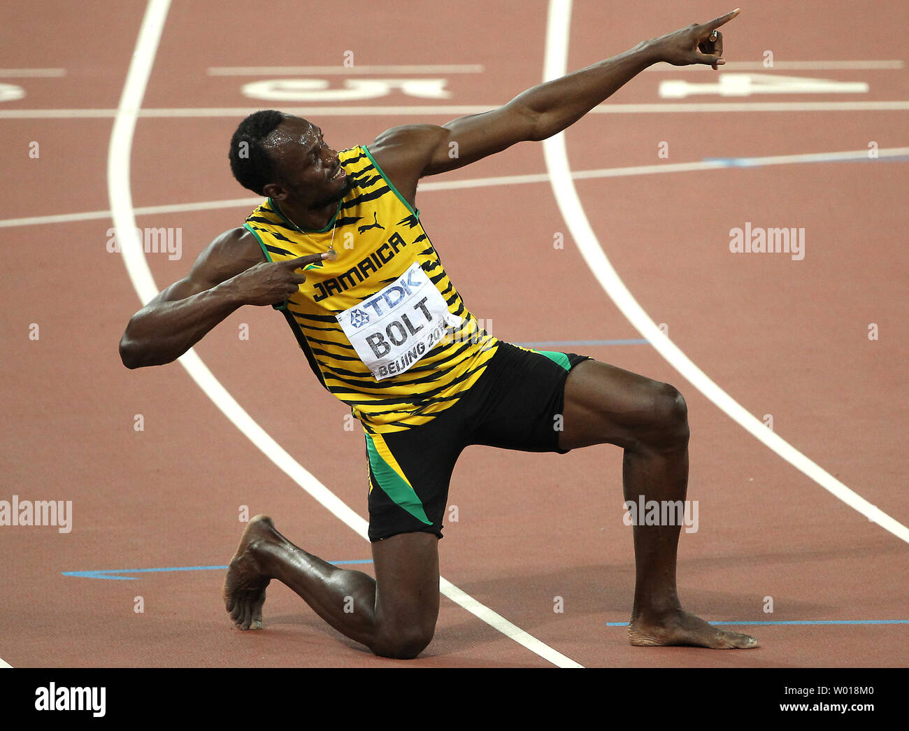 Jamaica's Usain Bolt celebrates after winning the 200 meters final at ...