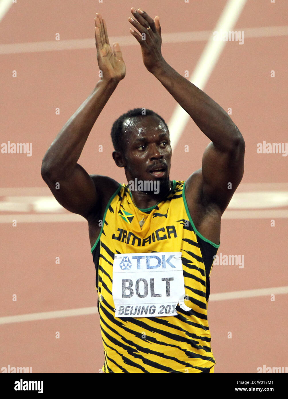 Jamaica's Usain Bolt celebrates after winning the 200 meters final at ...