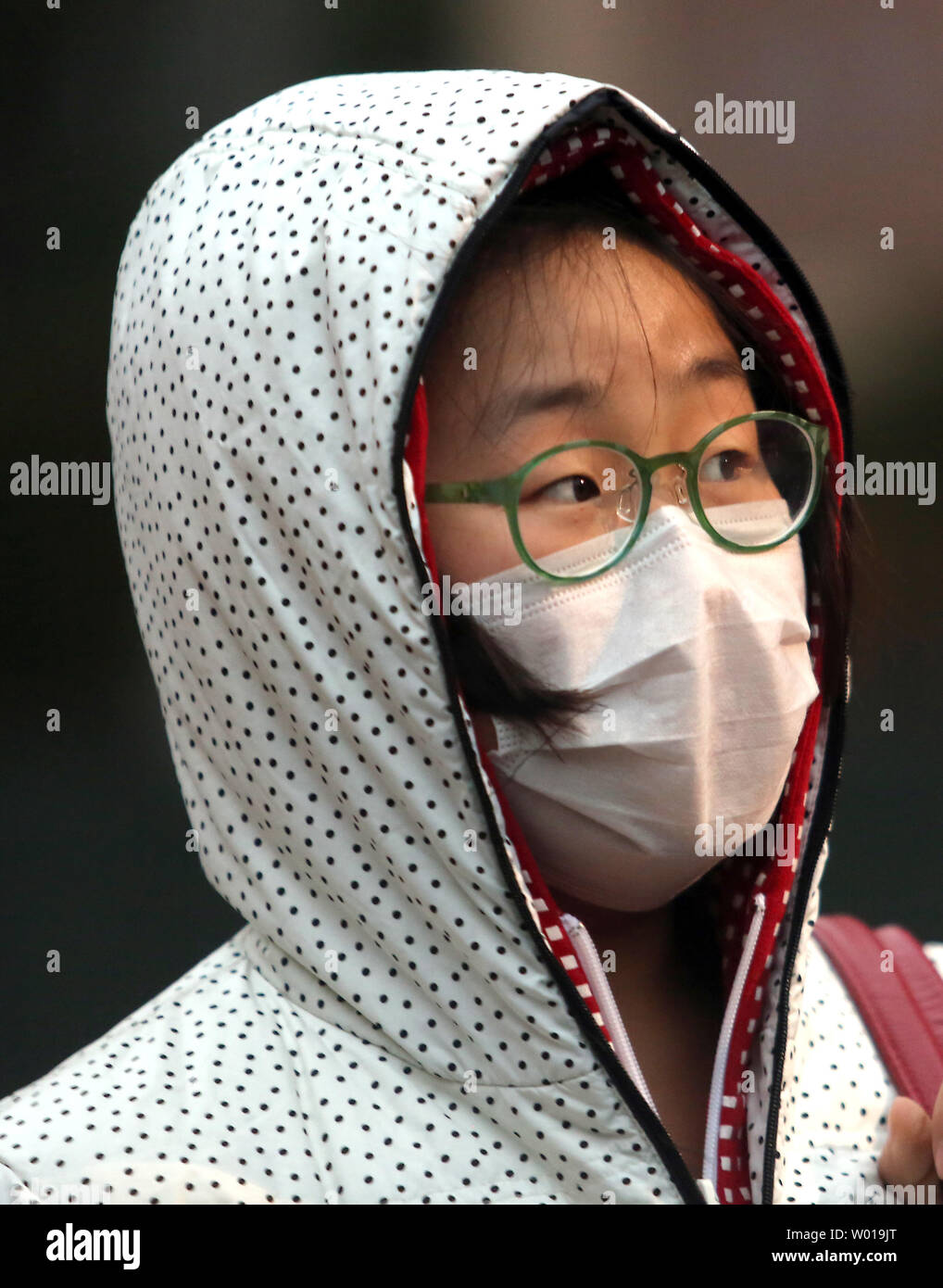 Chinese wear face masks as hazardous pollution hangs over central ...
