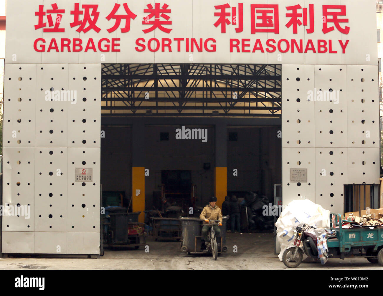 Chinese garbage collectors deliver both commercial and residential ...