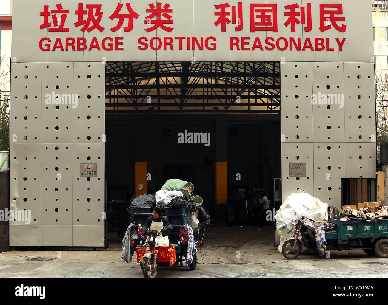 Chinese garbage collectors deliver both commercial and residential ...