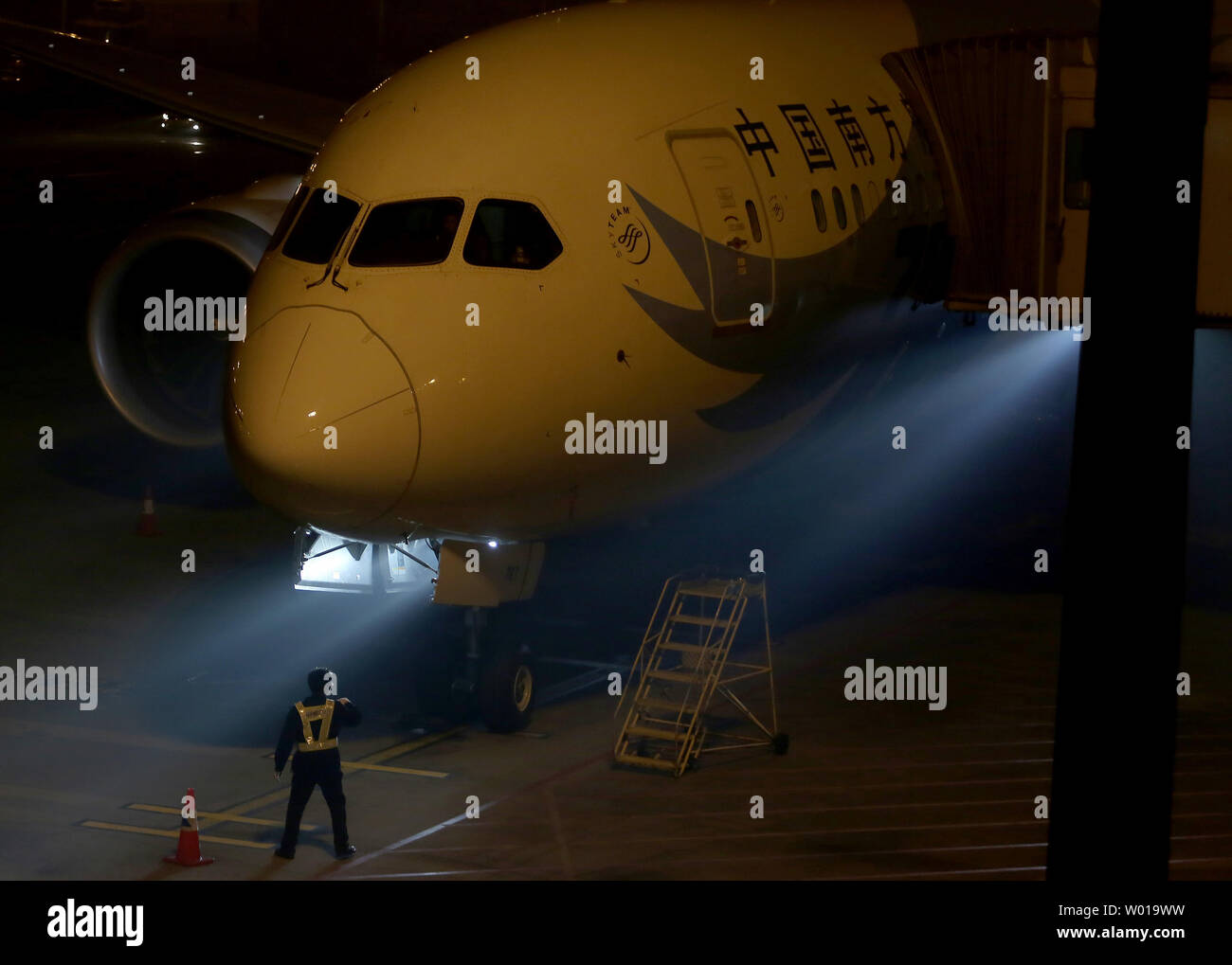 A Chinese passenger jet arrives at Beijing's international airport on ...