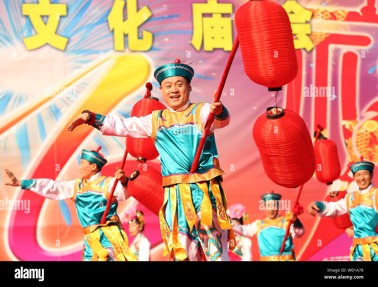 Chinese performers work at a Spring Festival fair in Beijing on ...