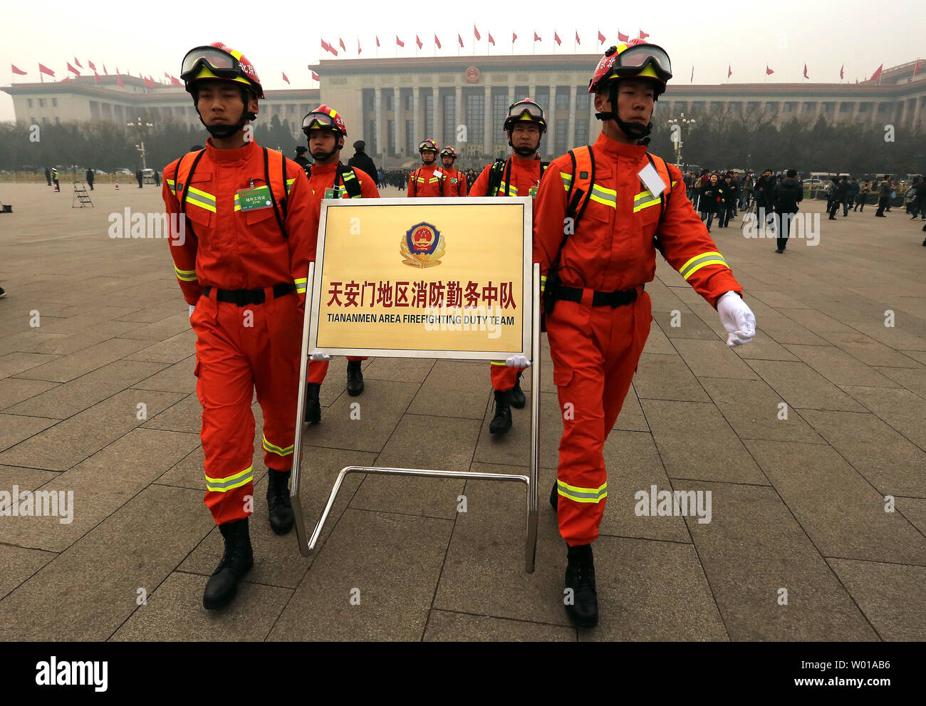 Chinese firemen take up positions on Tiananmen Square as China's top ...