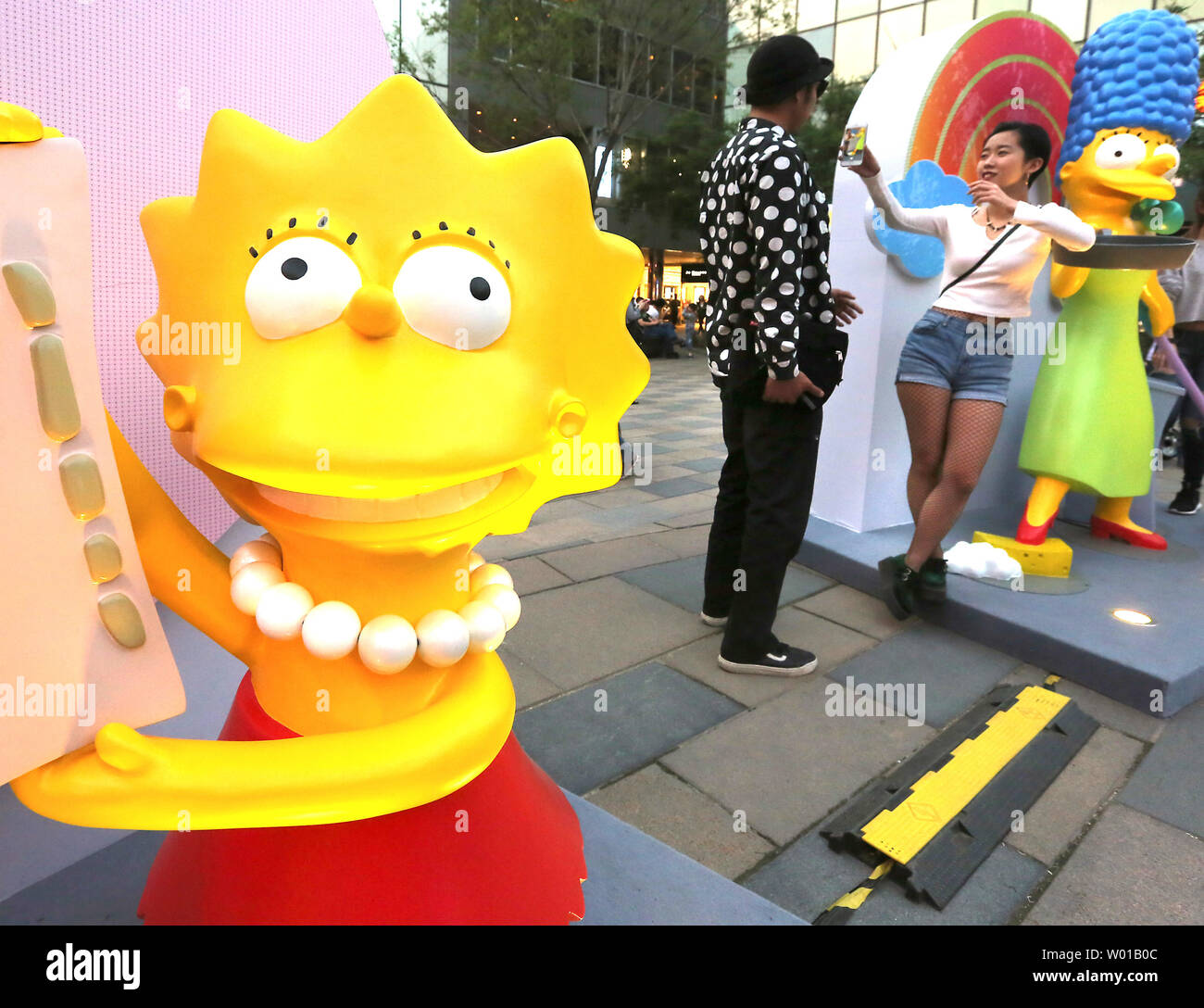 'The Simpsons' store is promoted at an international fashion mall in ...