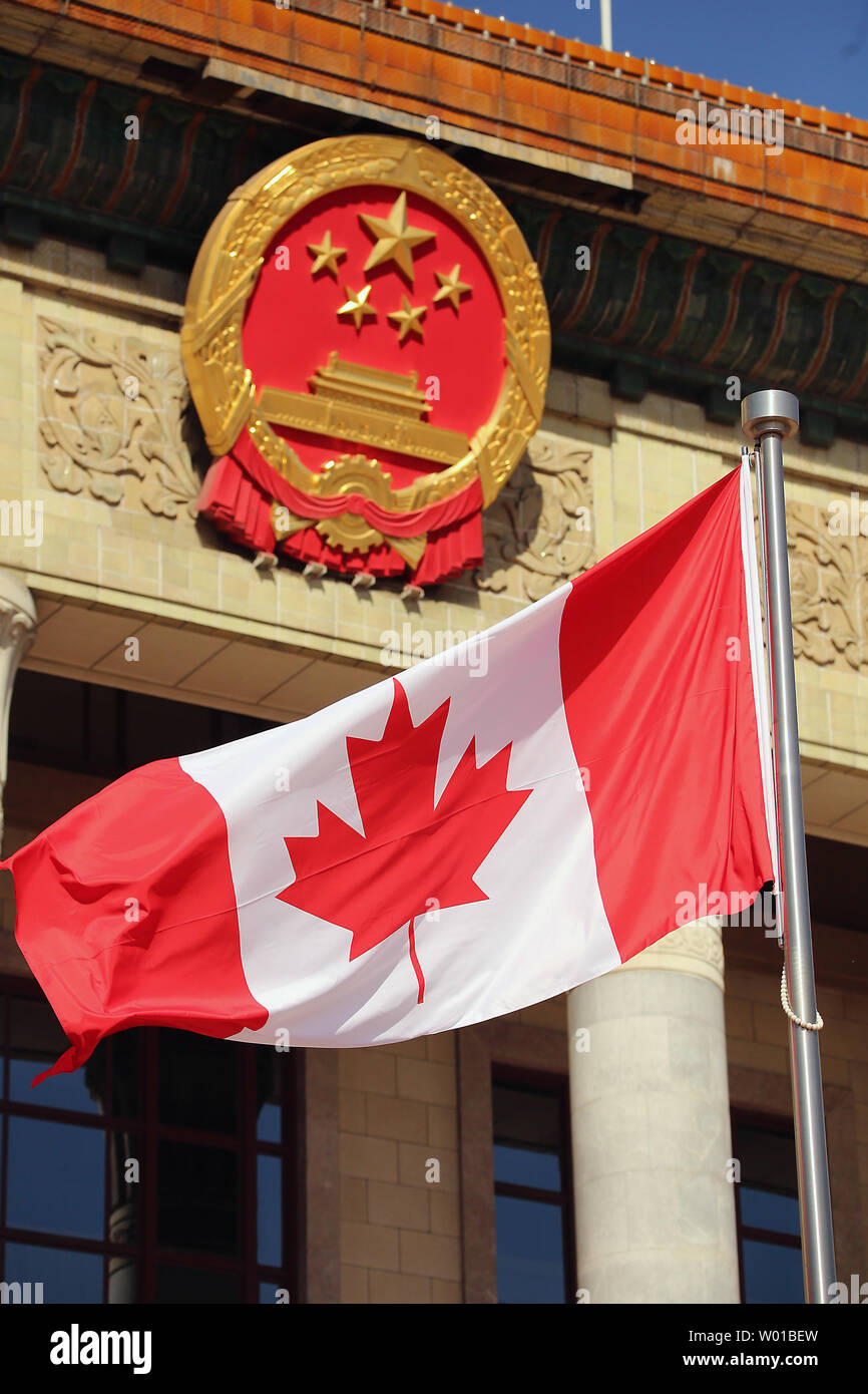 Canada's national flag flies in front of the Great Hall of the People ...