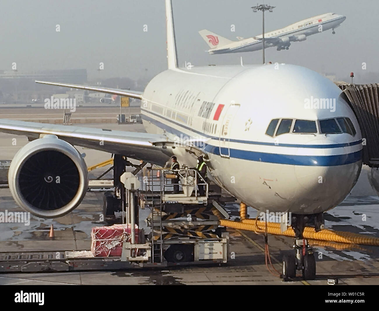 An Air China passenger jet arrives at Beijing's international airport ...
