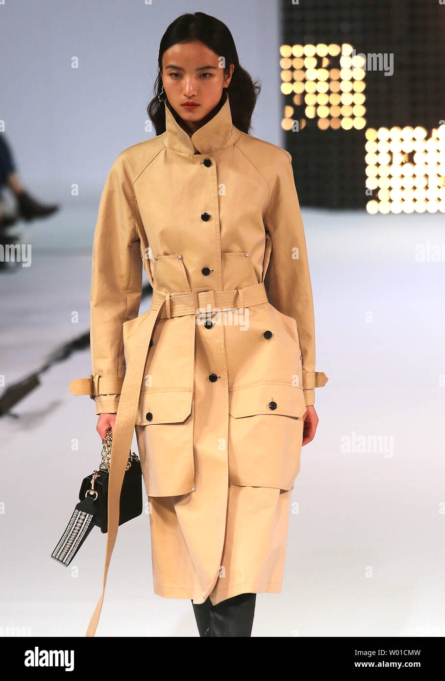 A Chinese model wears an outfit designed by Chinese fashion designer D ...