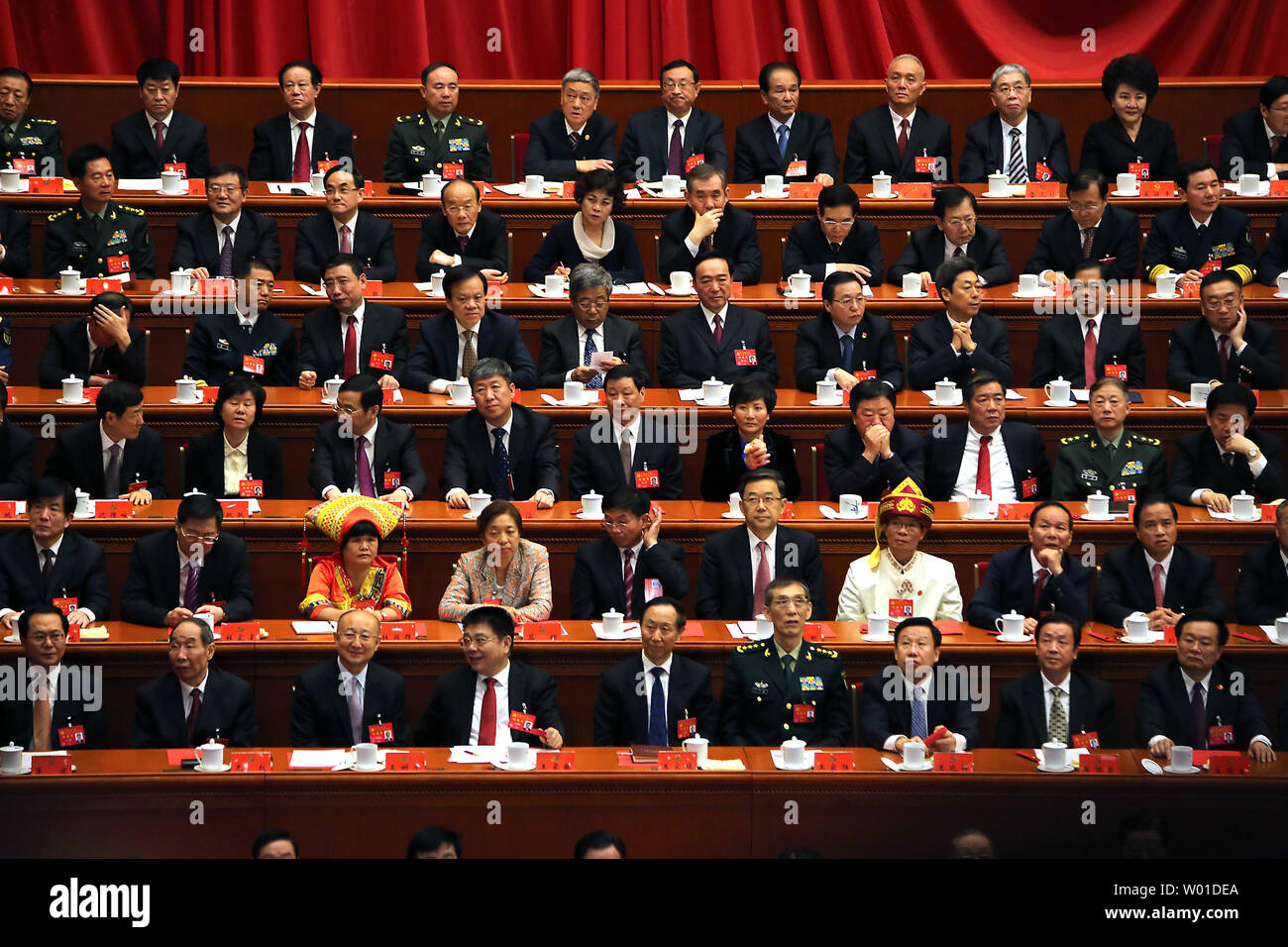 Chinese delegates attend the closing ceremony of the 19th National ...