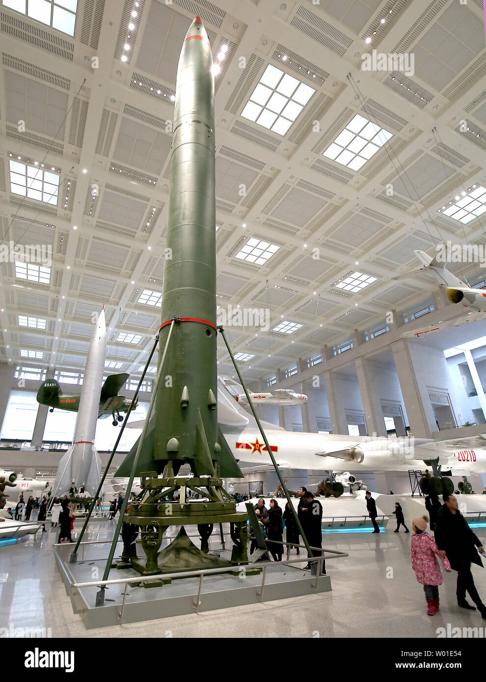Chinese look at the DF-1 and DF-2 ballistic missiles on display at the ...